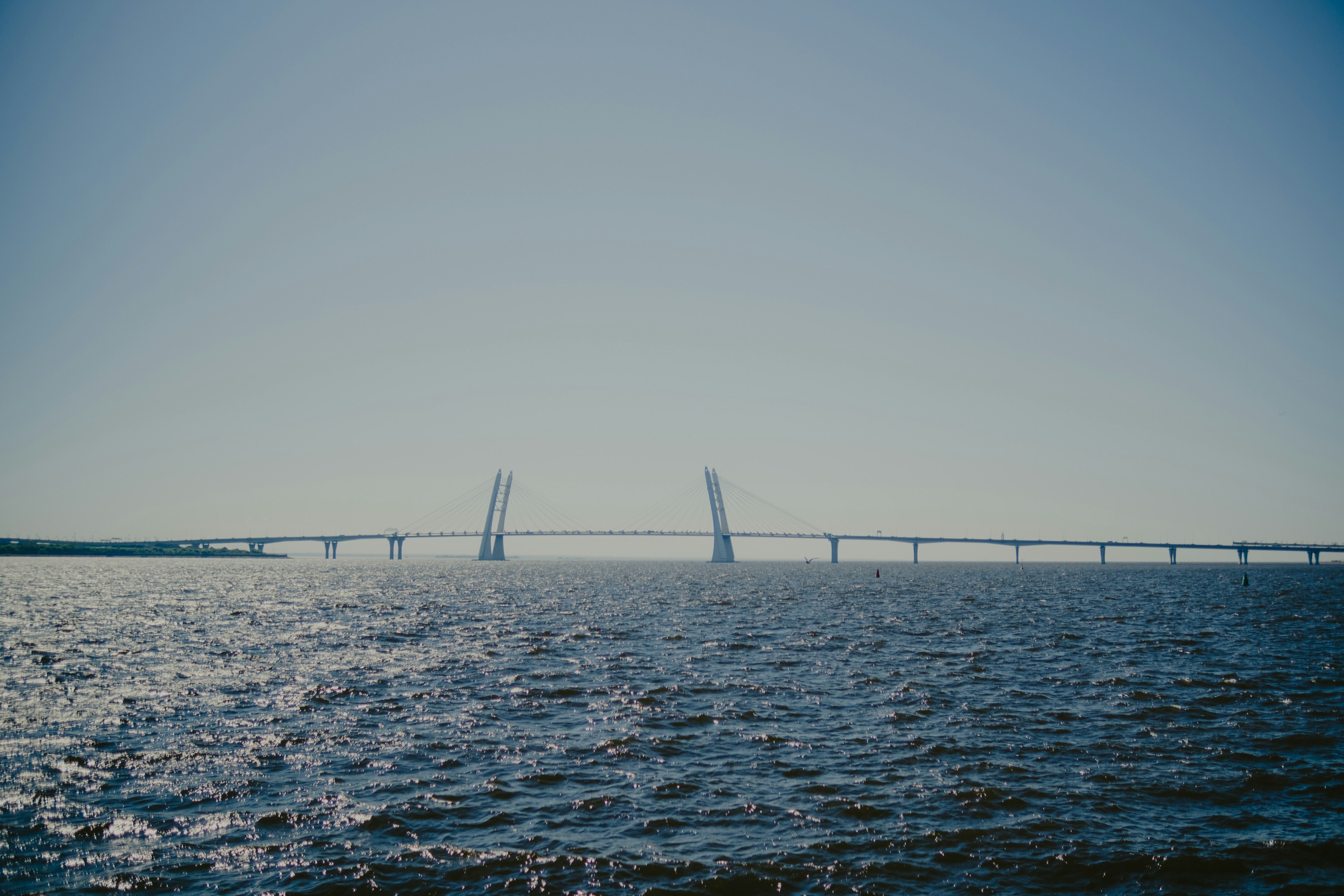 Bridge in Glassy Sea: A Quiet Horizon over the Tides