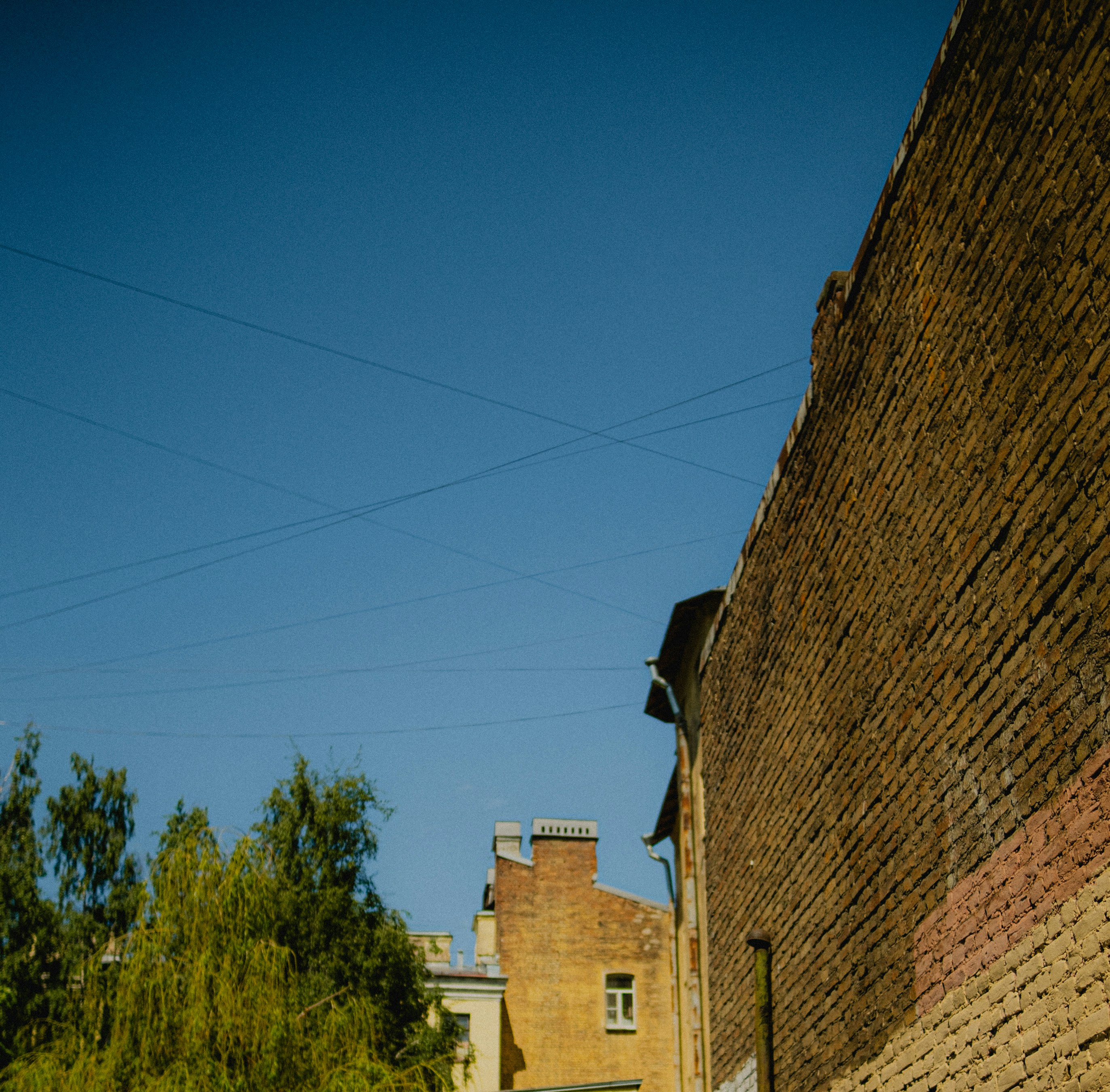 Brick Wall Skyscraper: Edge of a Quiet City