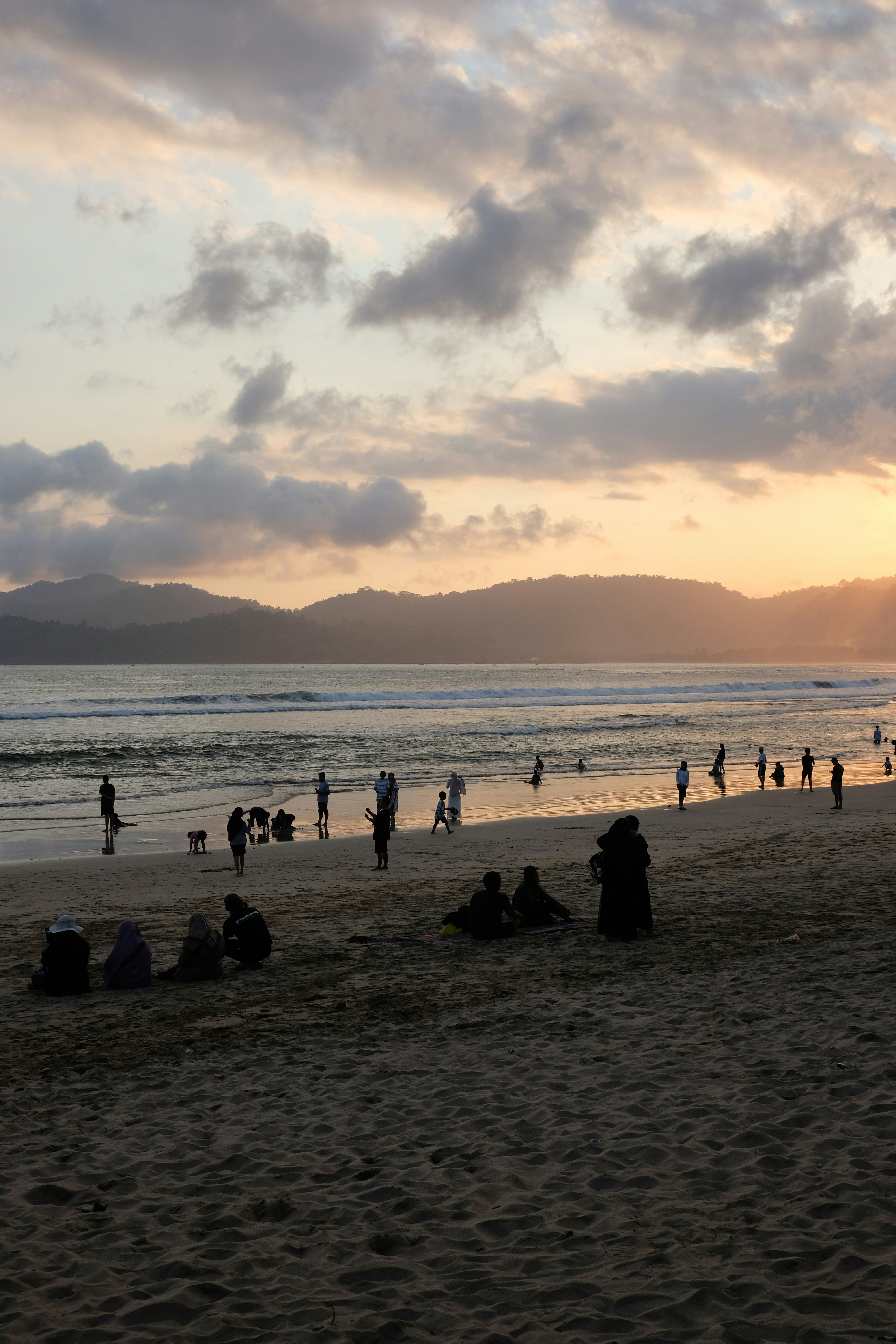 Sunset on the Quiet Strand: silhouettes and shoreline