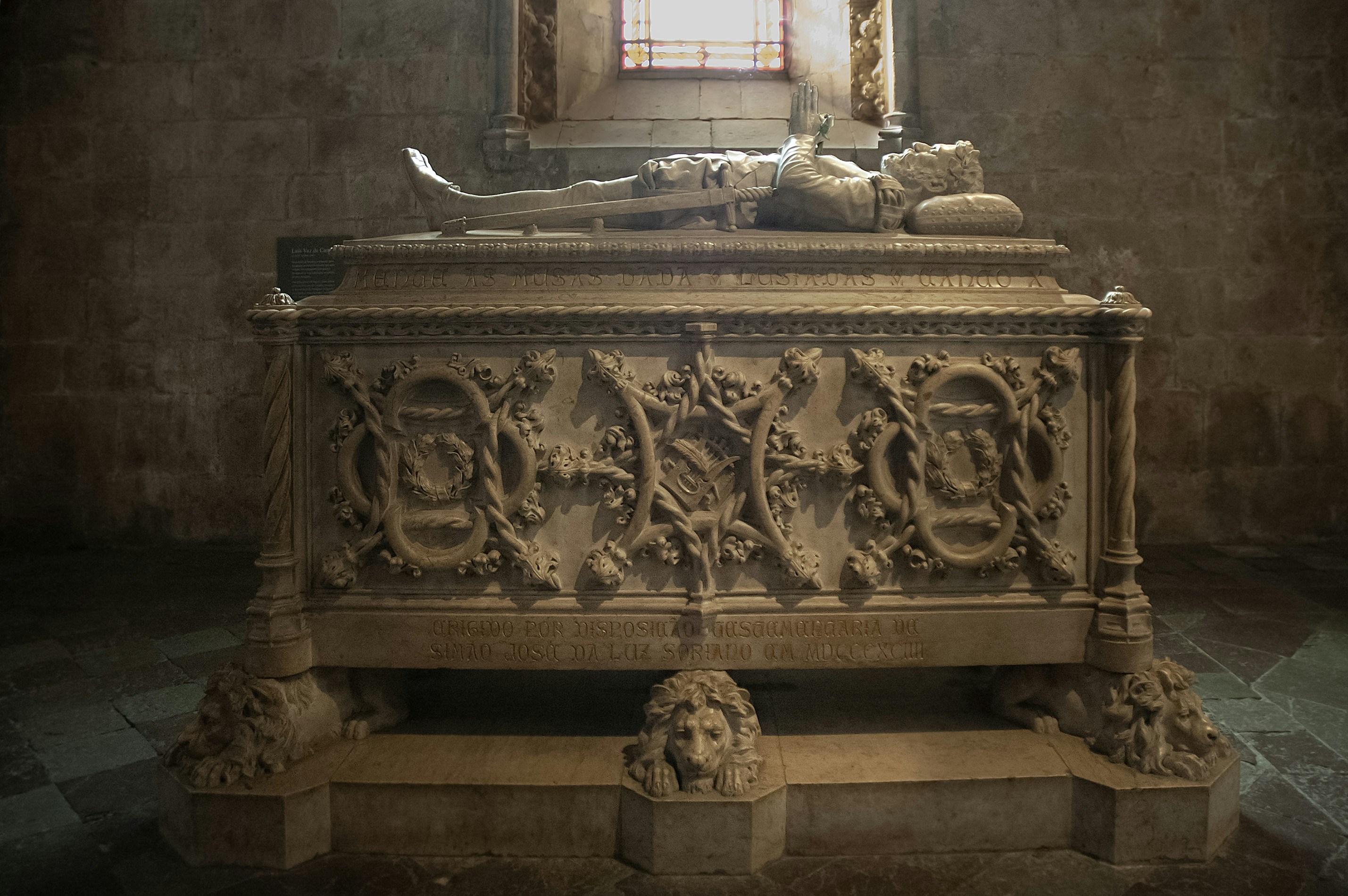 Stone Coffin Repose Under Dim Cathedral Light
