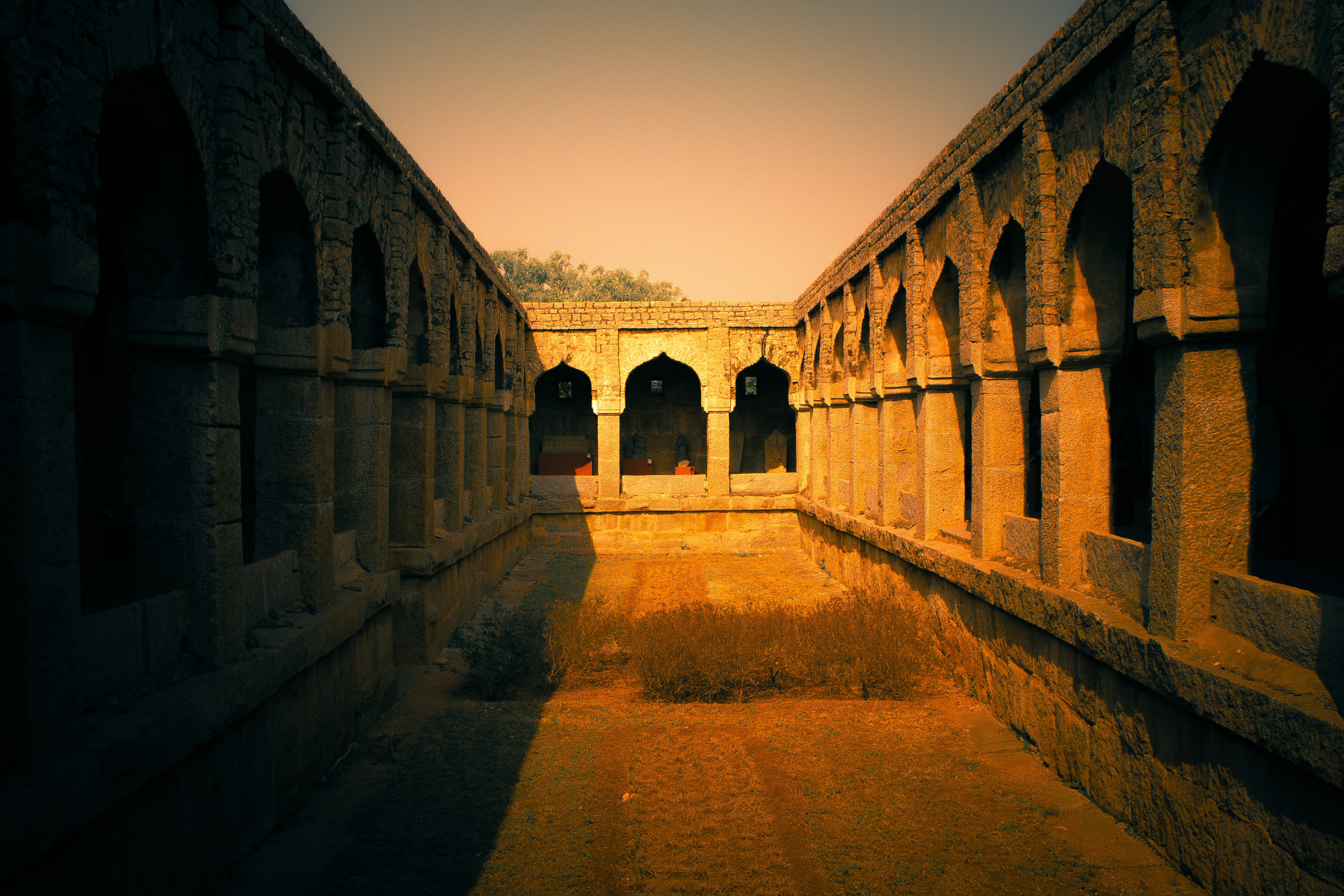 Echoes of Arcades: Sunlit Cenotaph Corridor