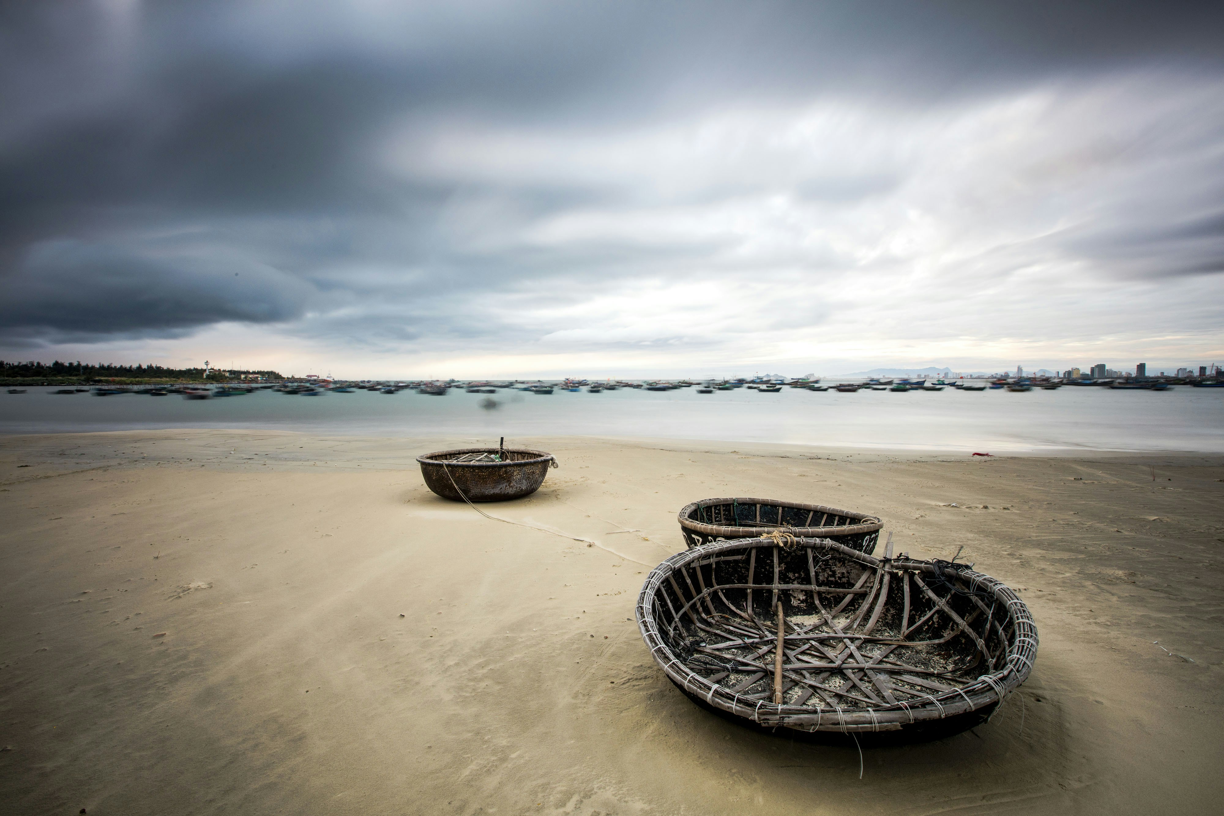 Wicker Boats on the Quiet Shore at Dusk