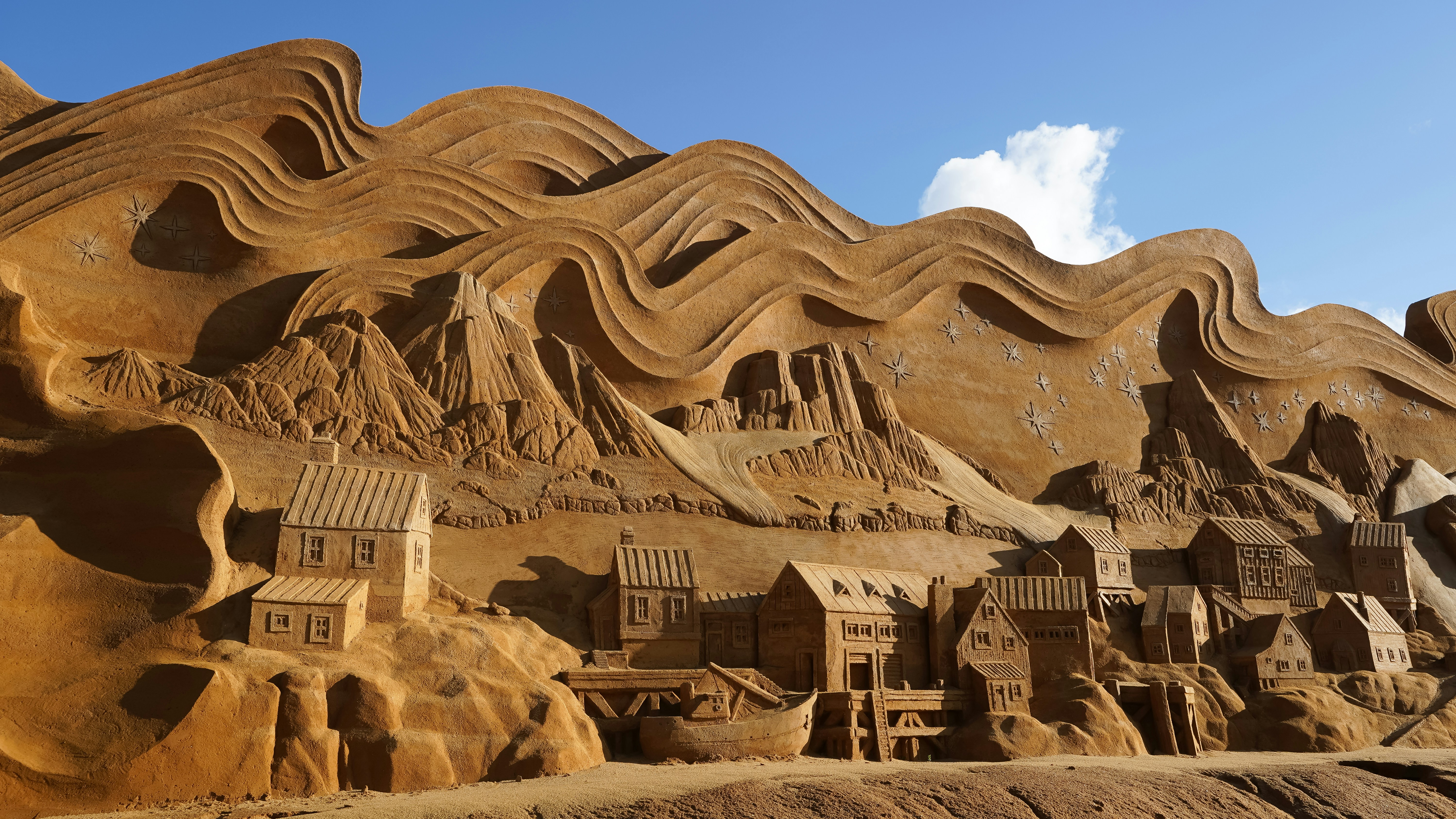 Dusty Edifice of Waves: An Ocean of Sand Carved into a Cityscape