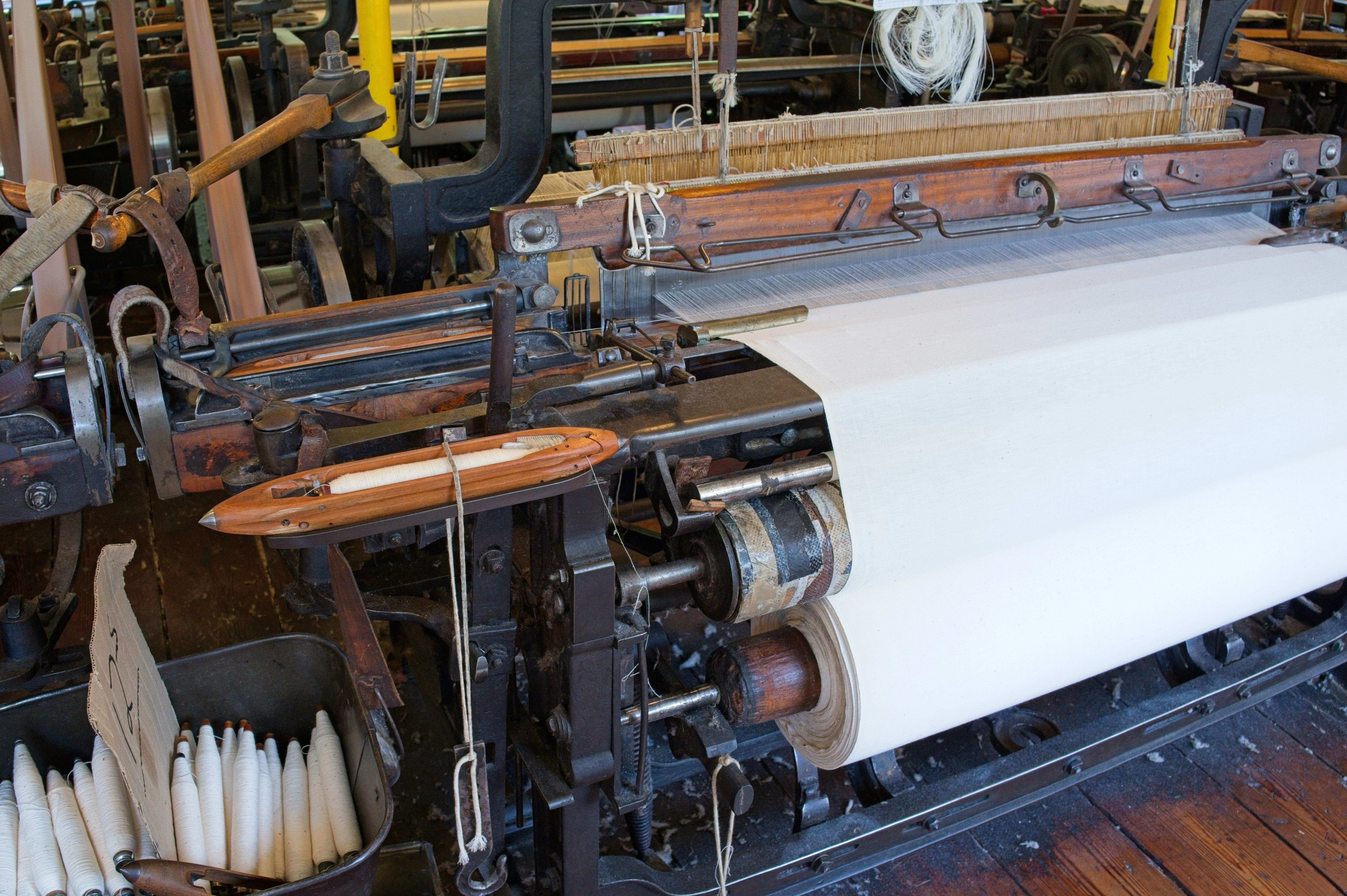 Interwoven Machinery: A Weave of Steel and Paper in Motion