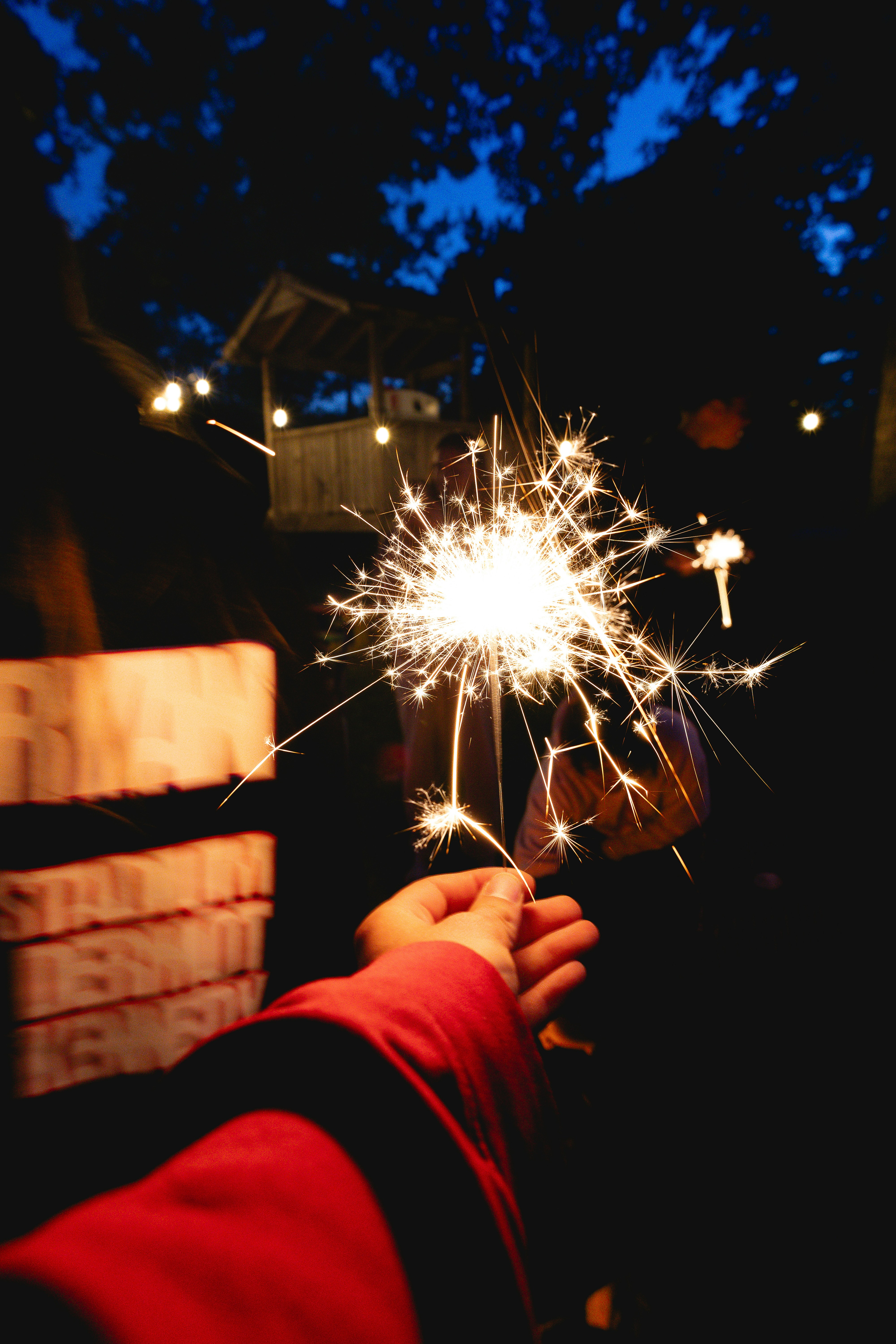 Sparkler Theater: A Handful of Light in Evening Shadows