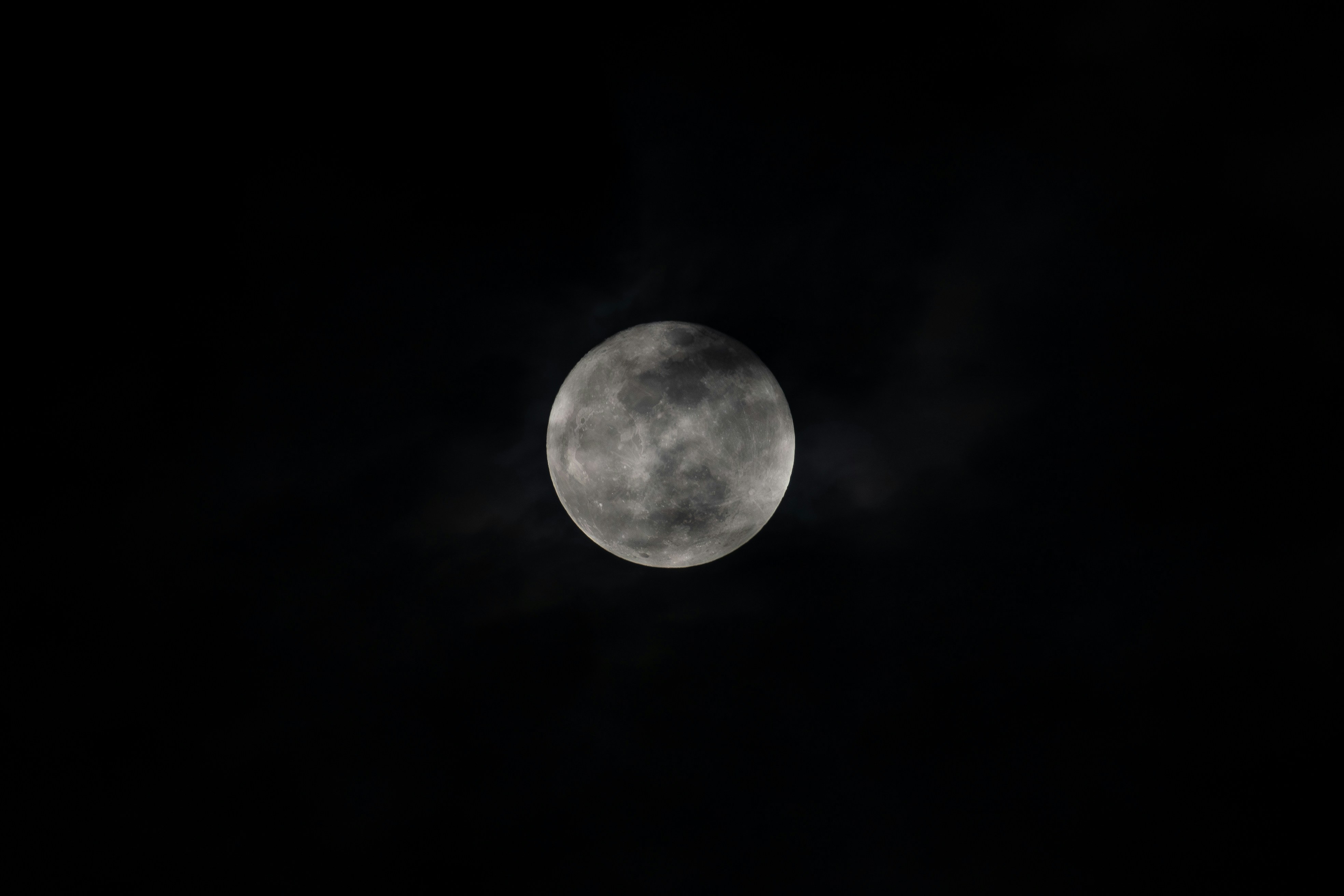 Moonring in the Night: A Quiet Luminous Disk in Black