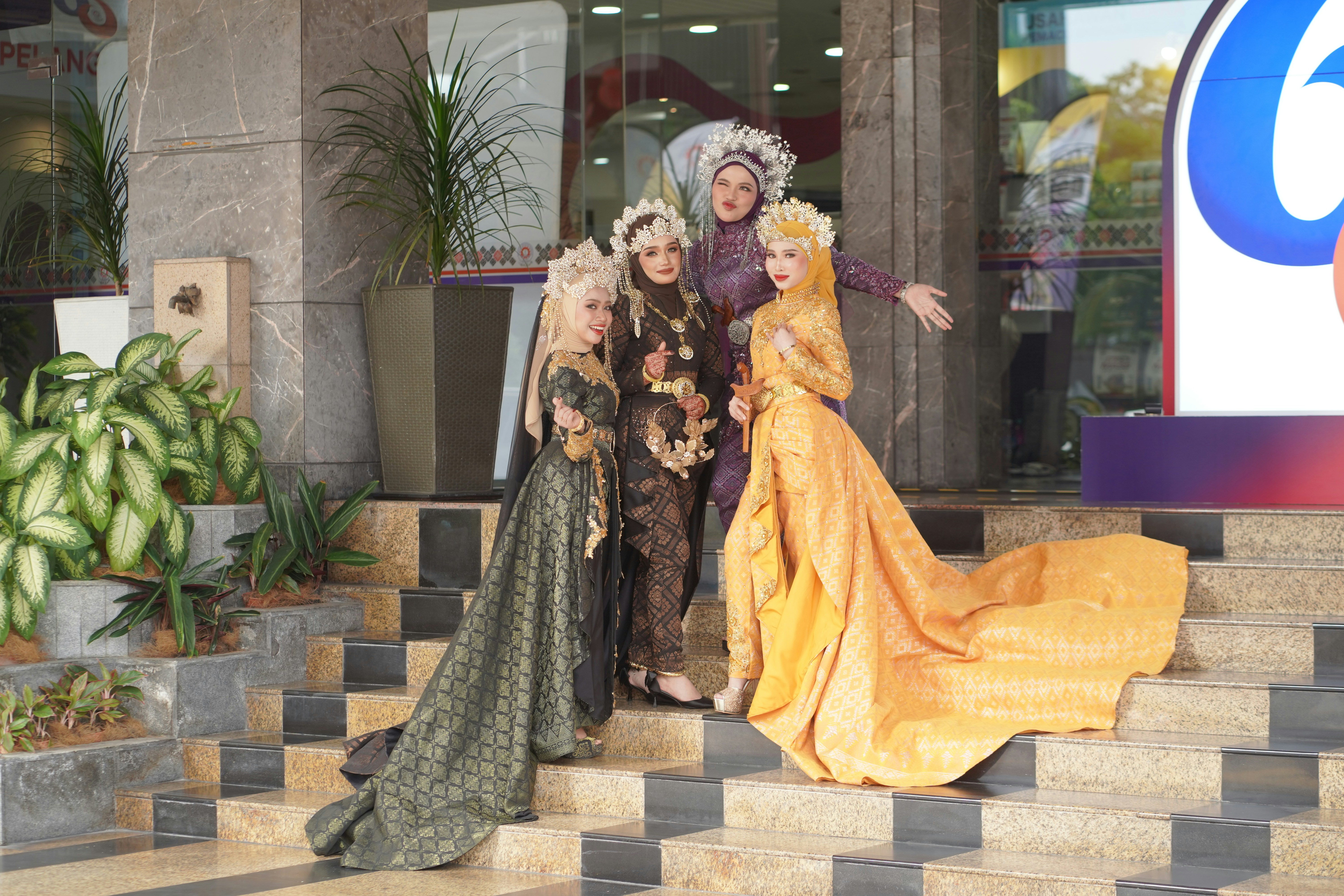 Royal Entrance: Dressed in Silk and Gold on Stairs