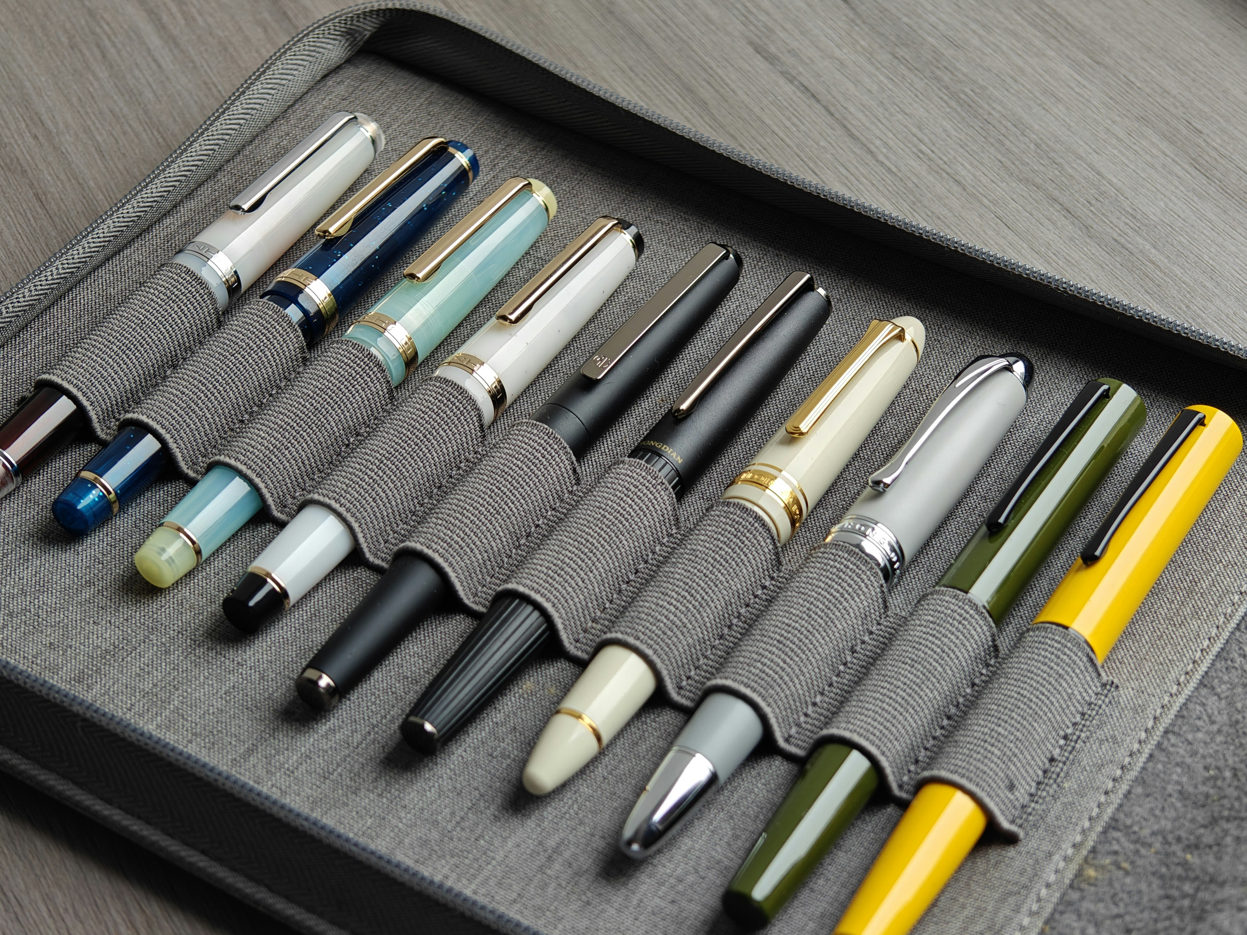 Row of Executive Fountain Pens in a Leather Tray