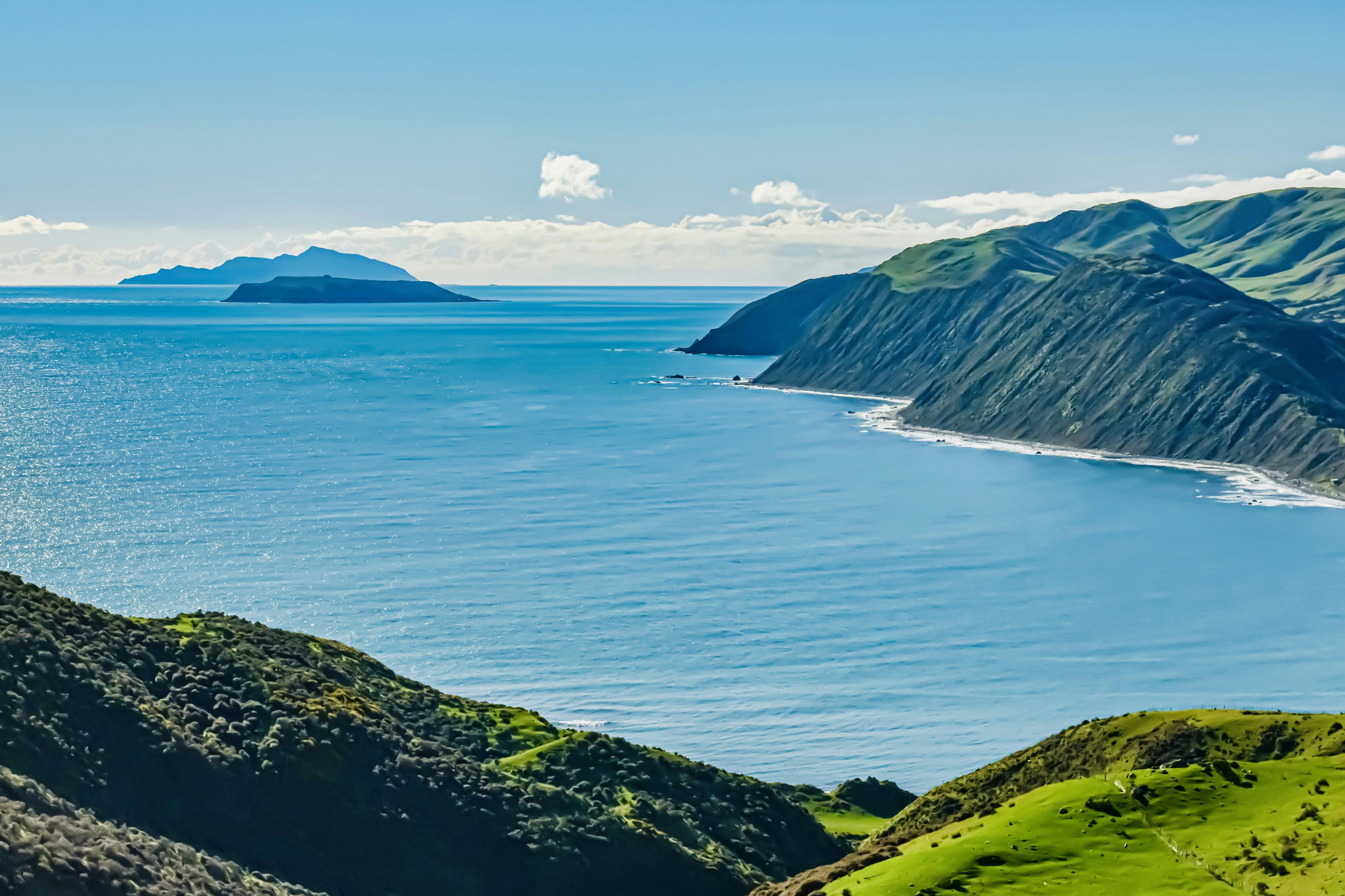 Azure Coastline: Sunlit Cliffs Meeting the Open Sea