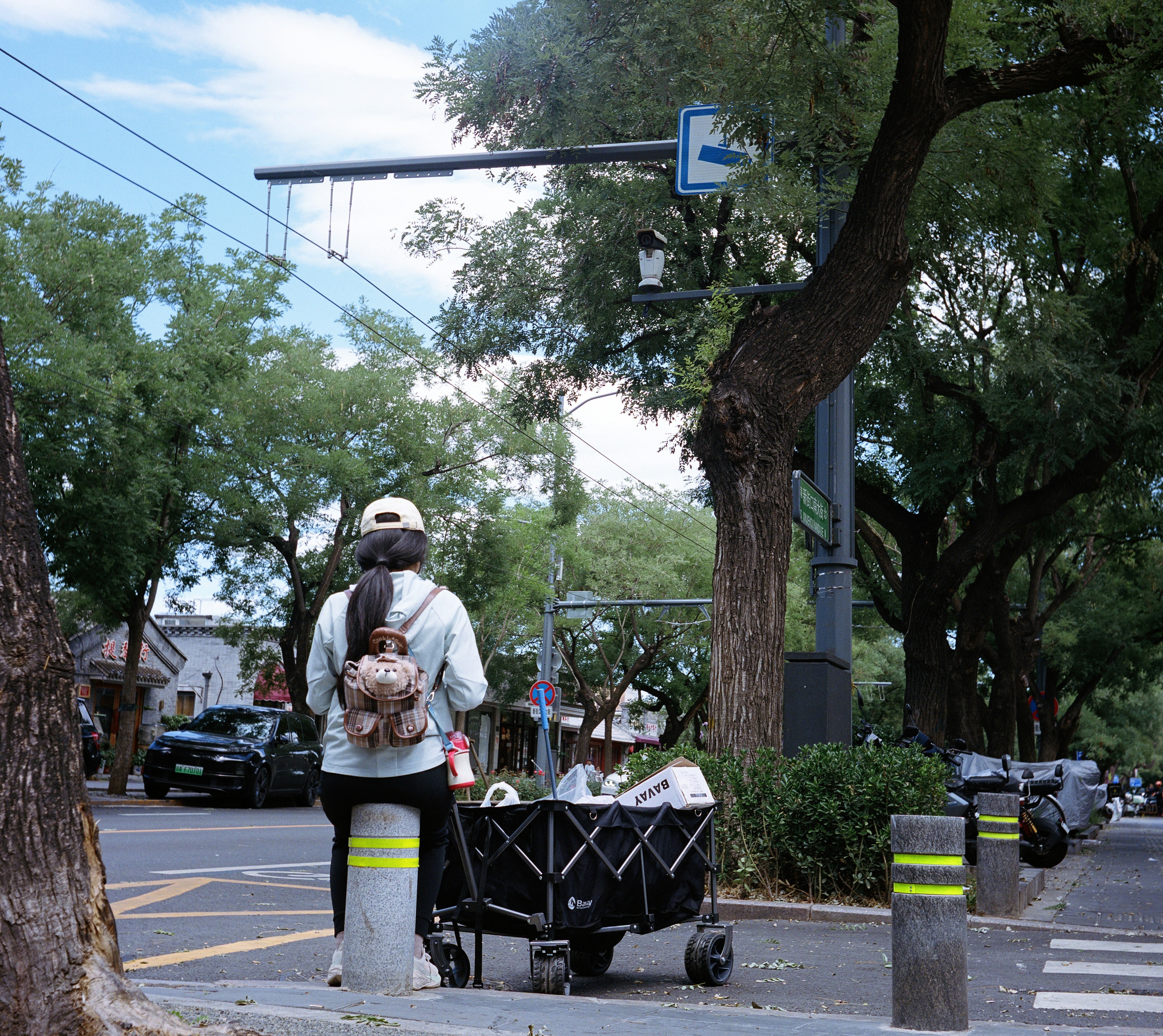 Backpedaling Observer: A Street Corner Palette with a Backpack