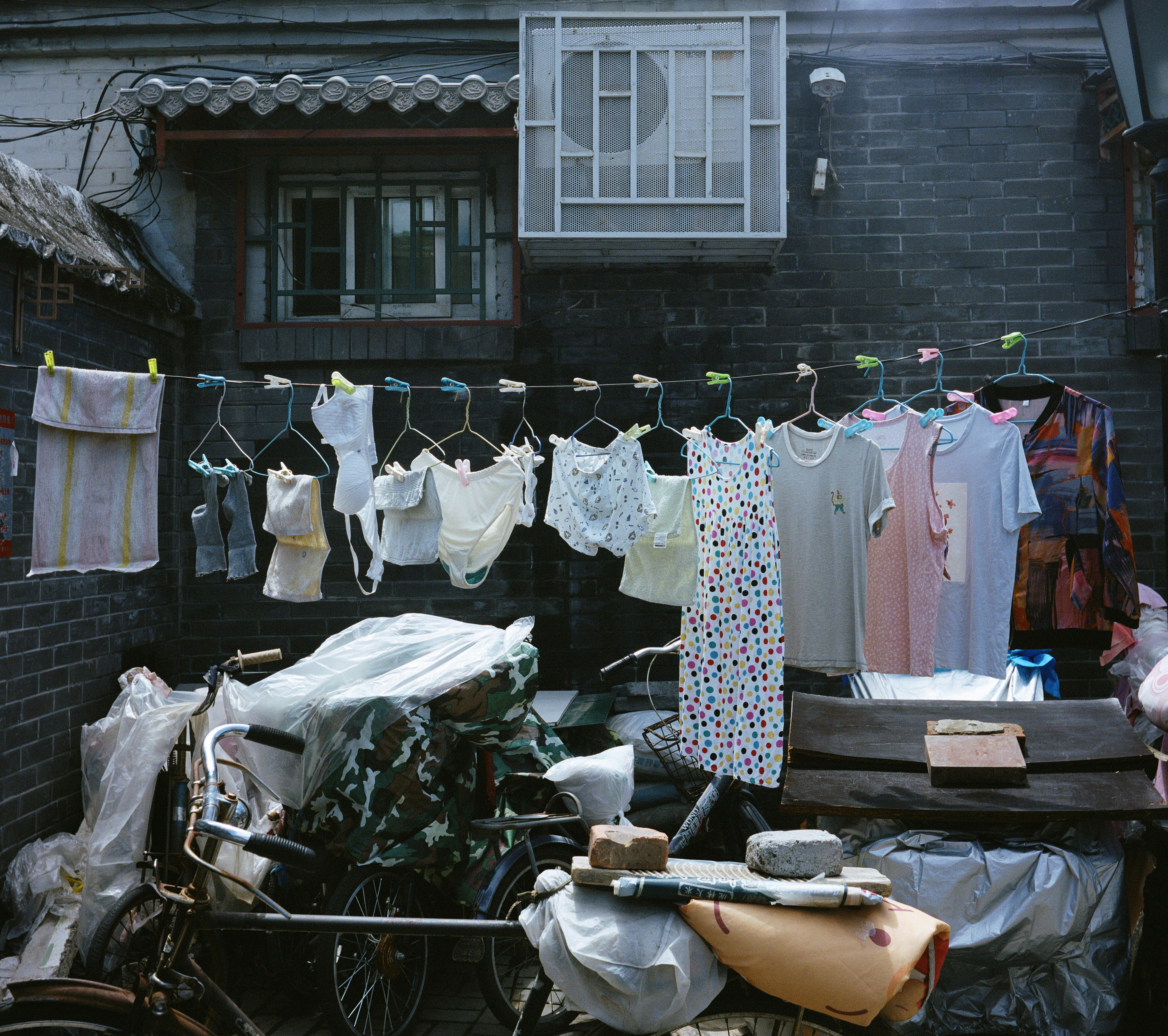Laundry Day in a Narrow Courtyard
