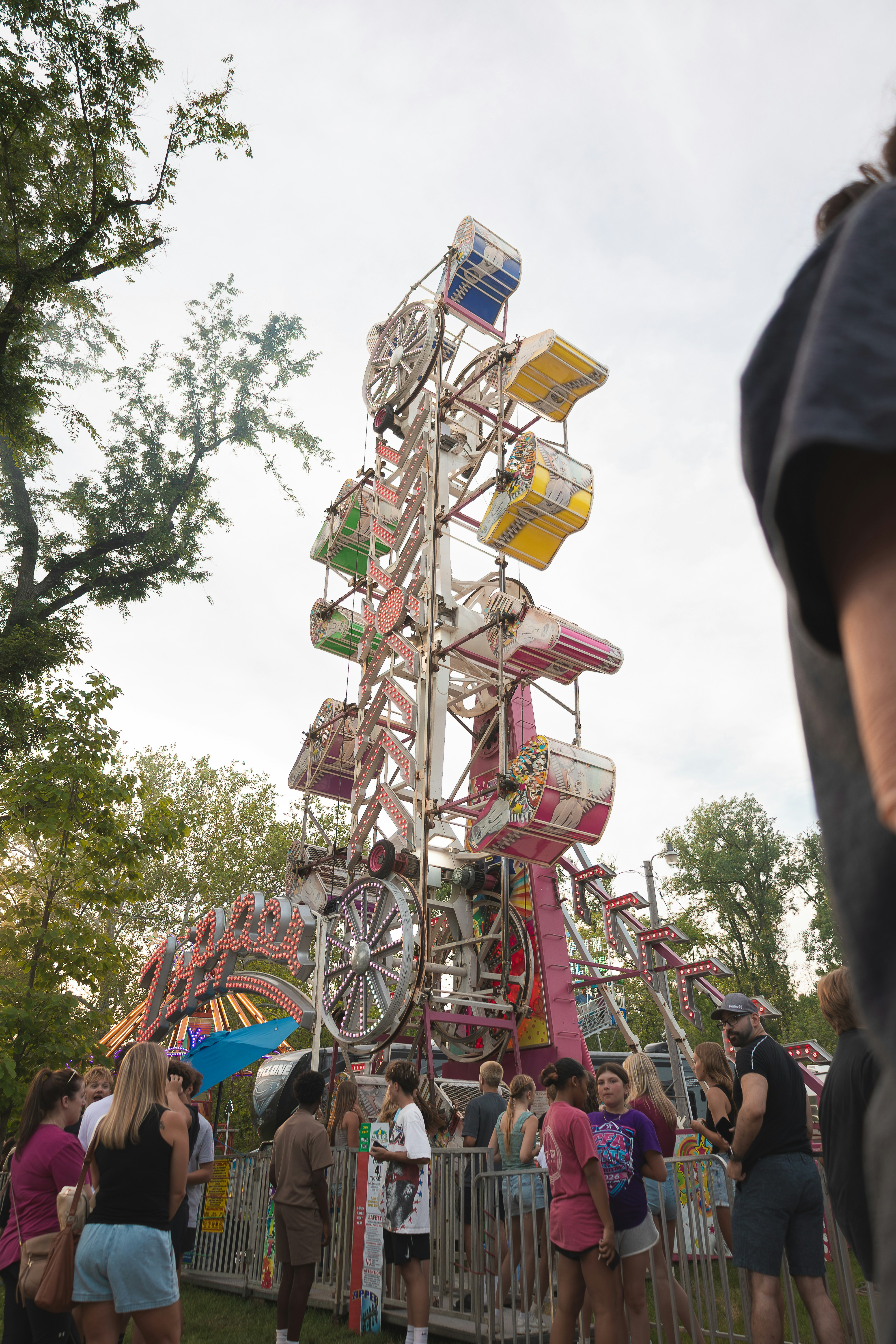 Ferris Wheel Tower at a Summer Fair
