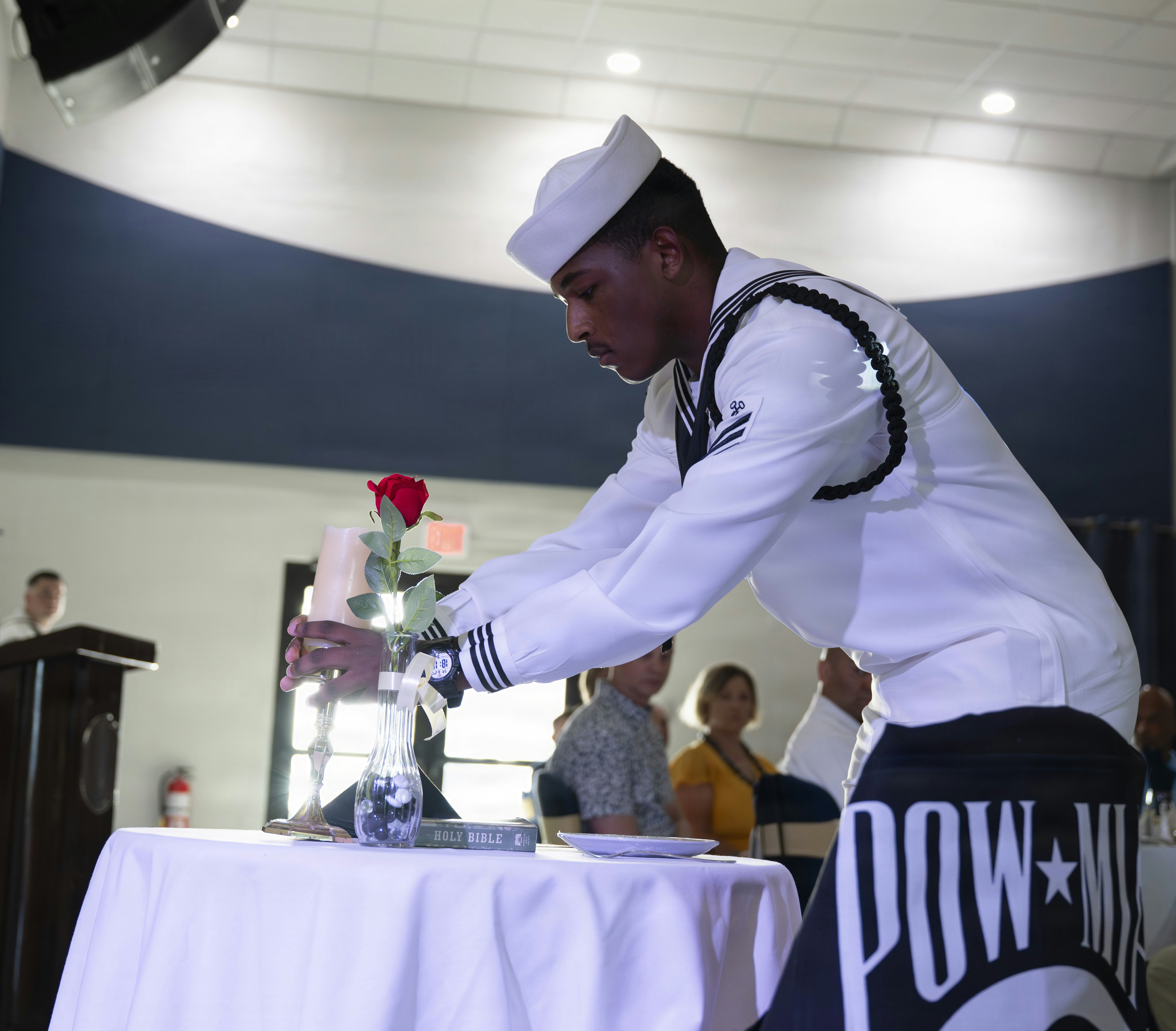 Ceremonial Rose: A Sailor's Gesture at the Table