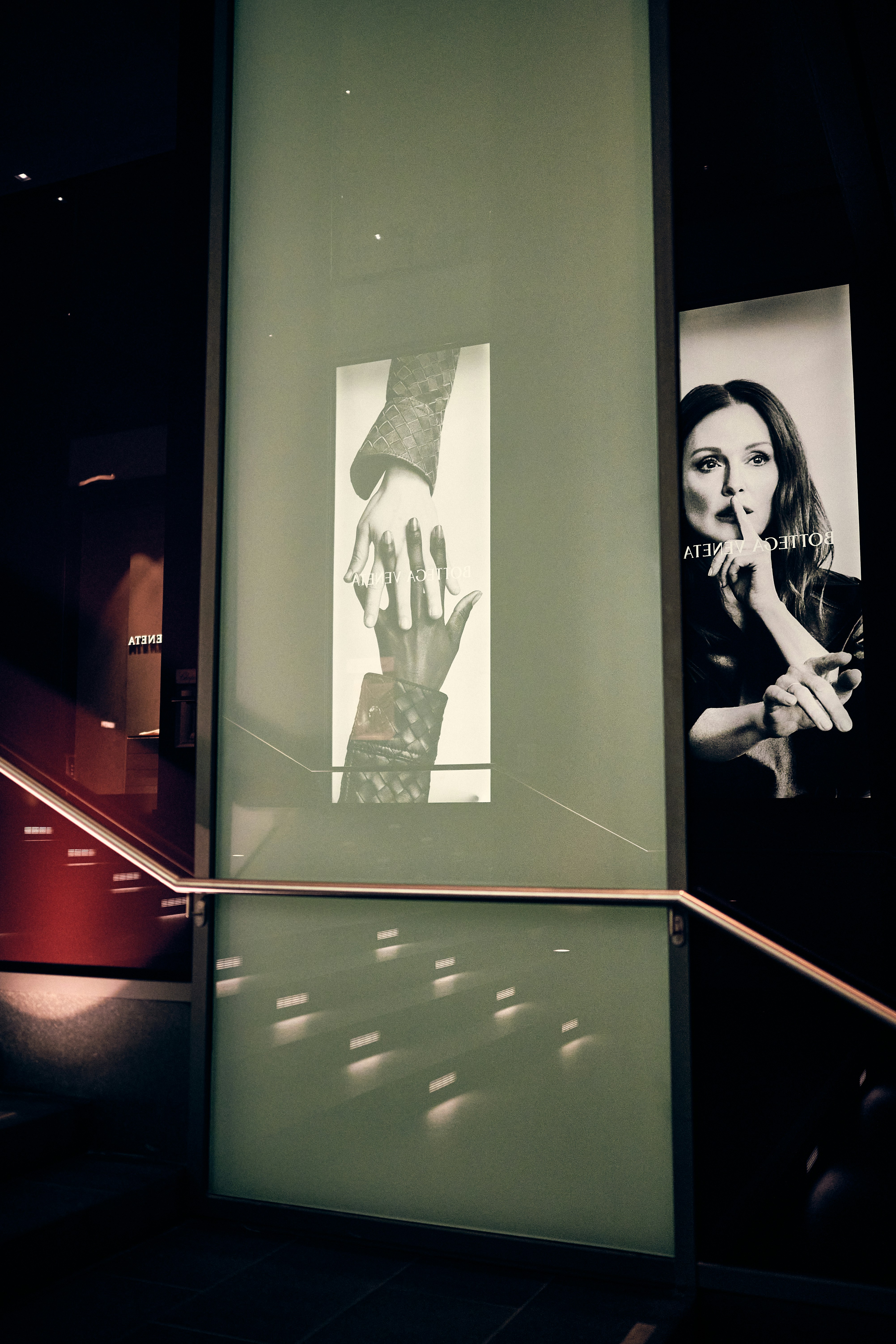 Hands and Portrait: A Quiet Interaction in Glass and Light