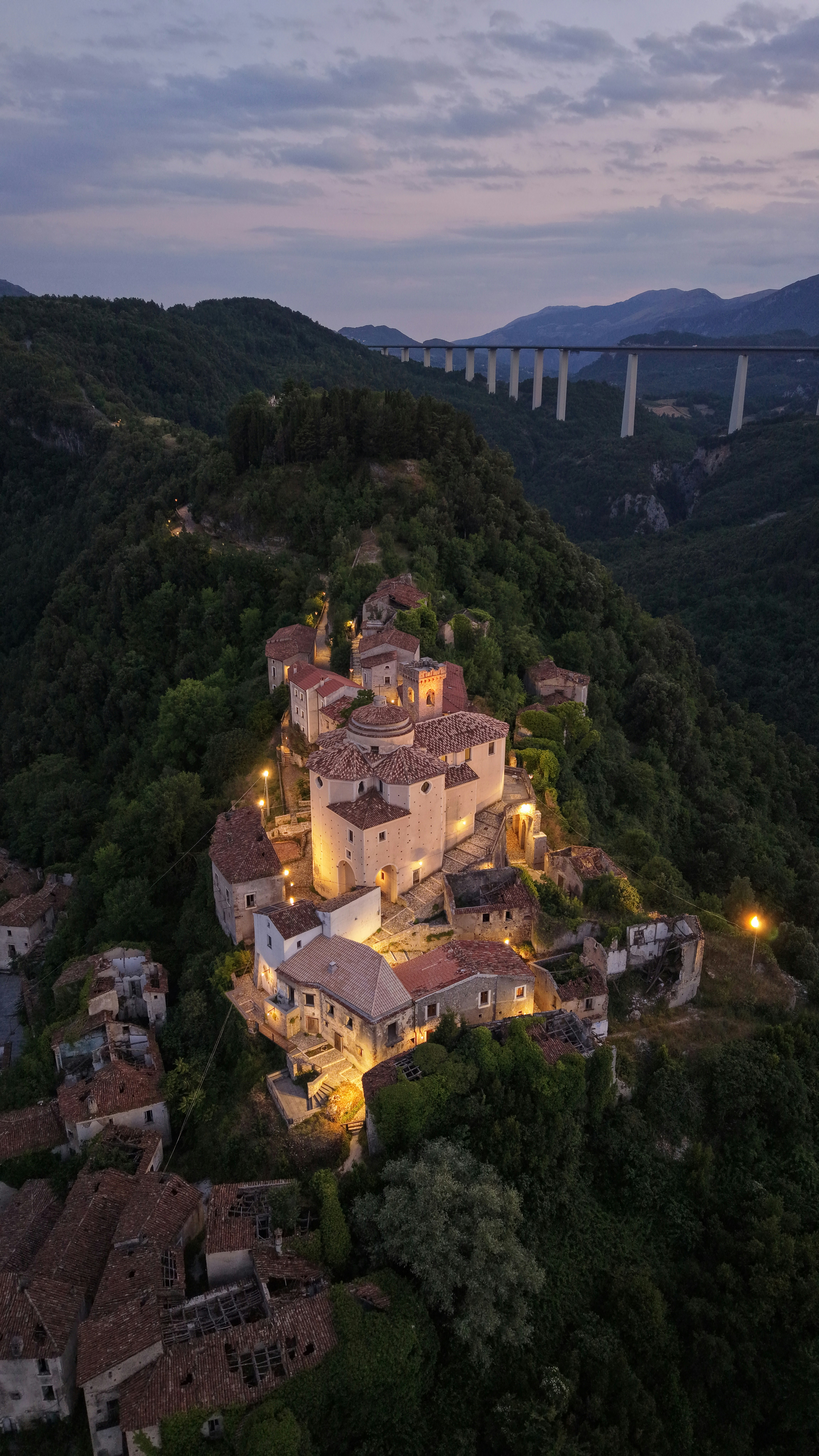 Hilltop Village Sunrise: A Stitched Tale of Stone and Sky