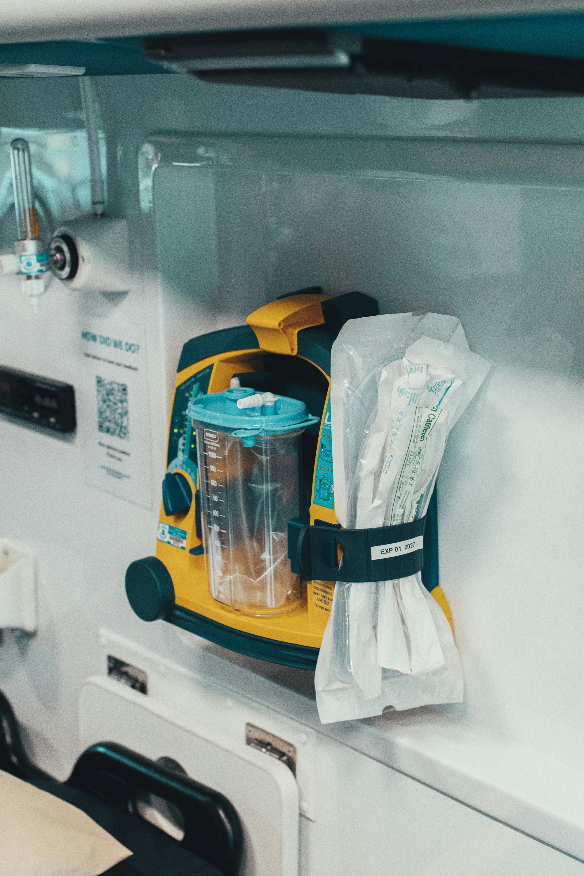 Emergency Kit Dispenser: A Bright Yellow Medicentral in an Ambulance