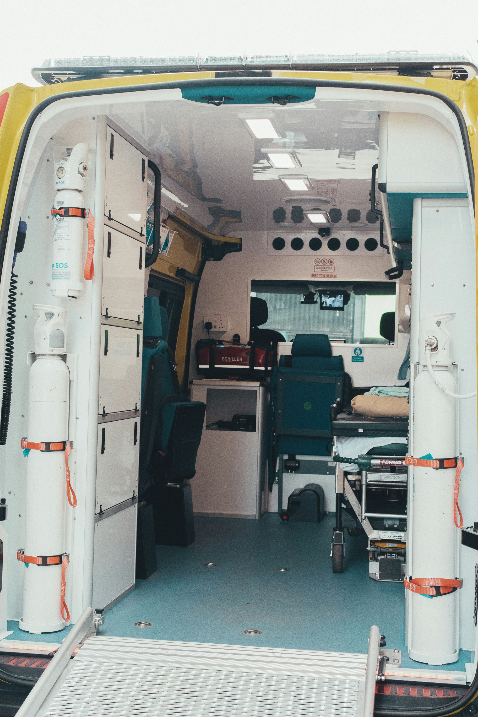 Rear Cabin of an Ambulance: Organized Life-Support Nook with Equipment Racks