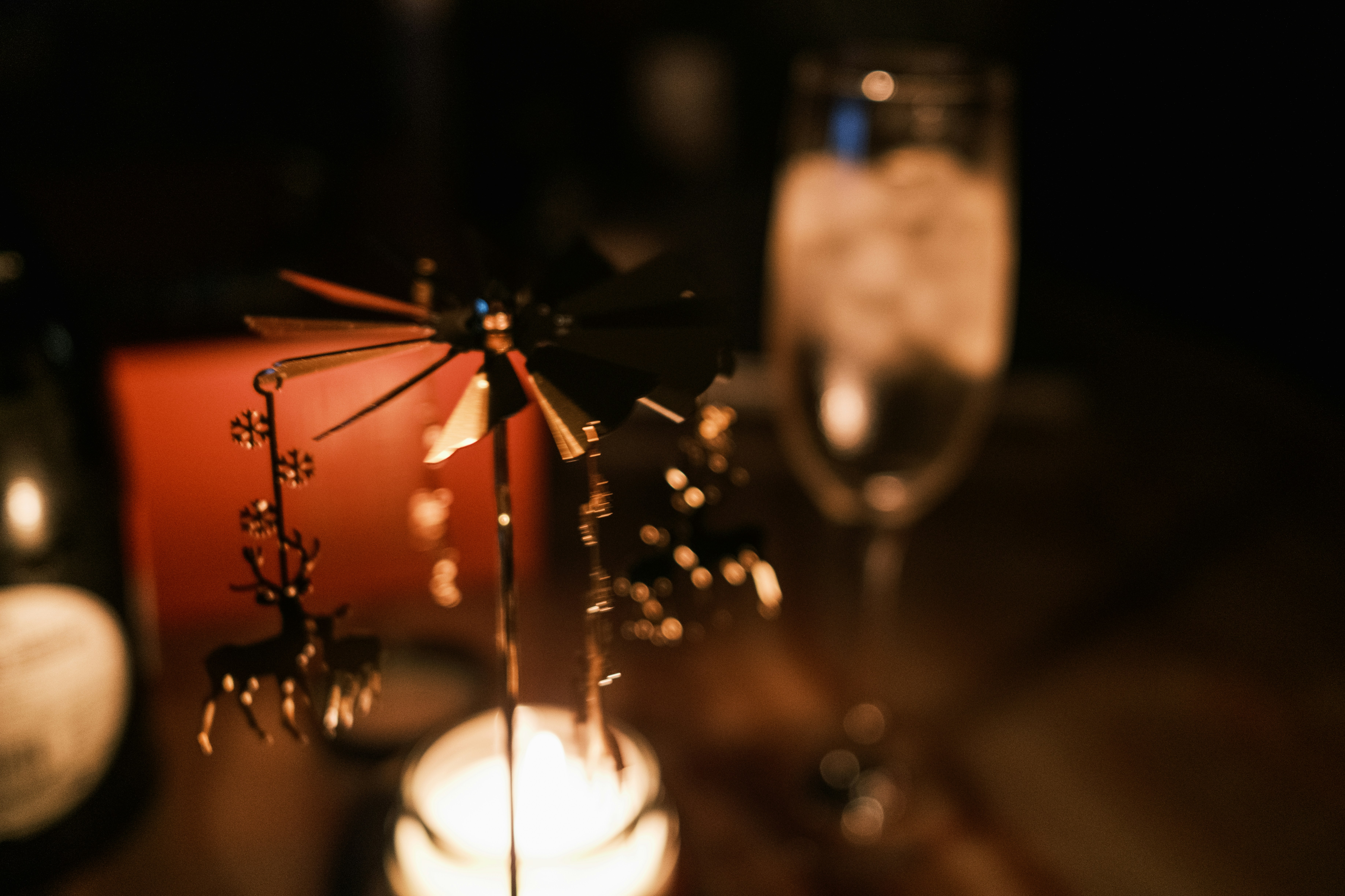 Warm Glow Over a Tiny Windmill: A Quiet Tabletop Moment
