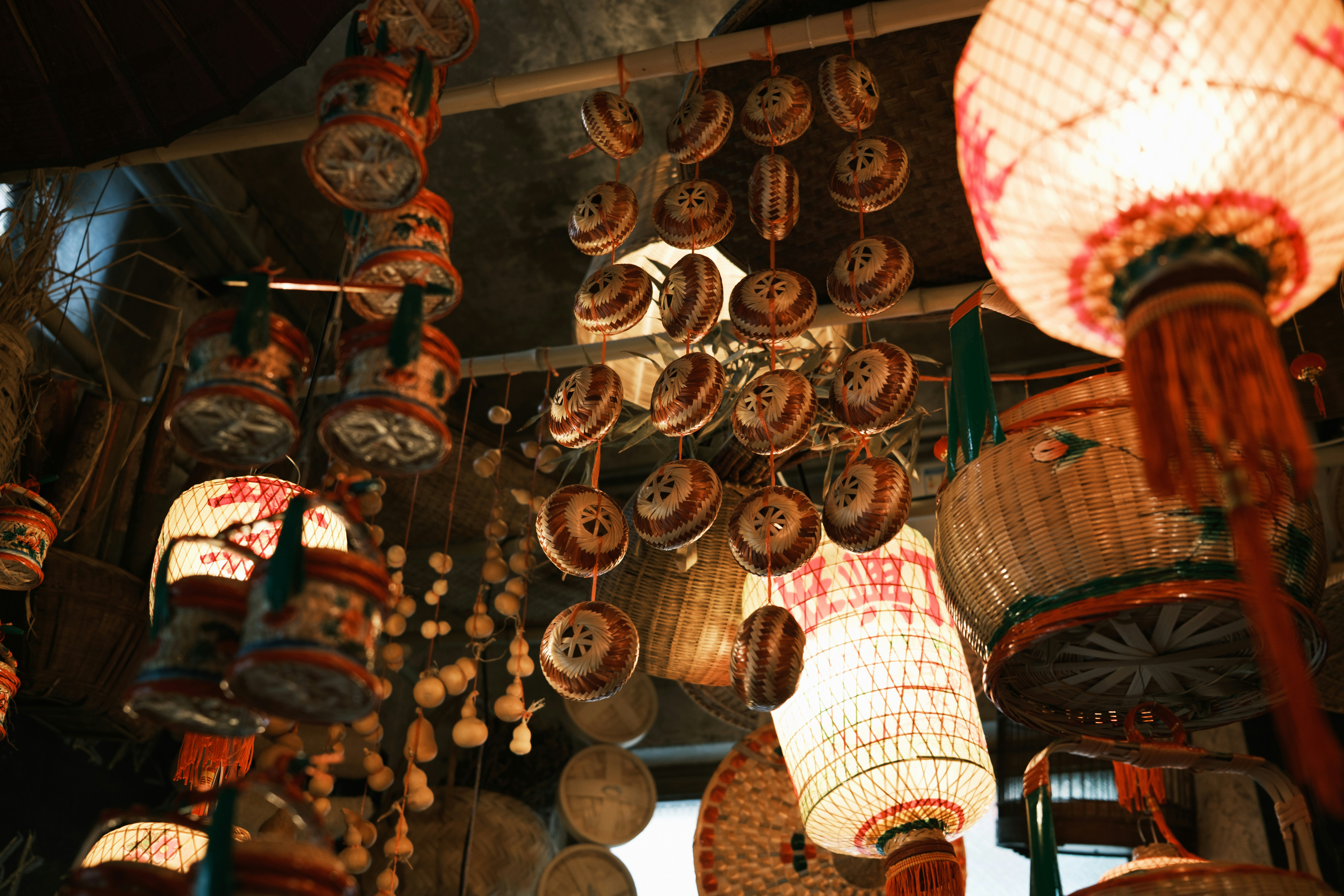 Lanterns in a Chinese Market: Warm Light Amid Hanging Orbs