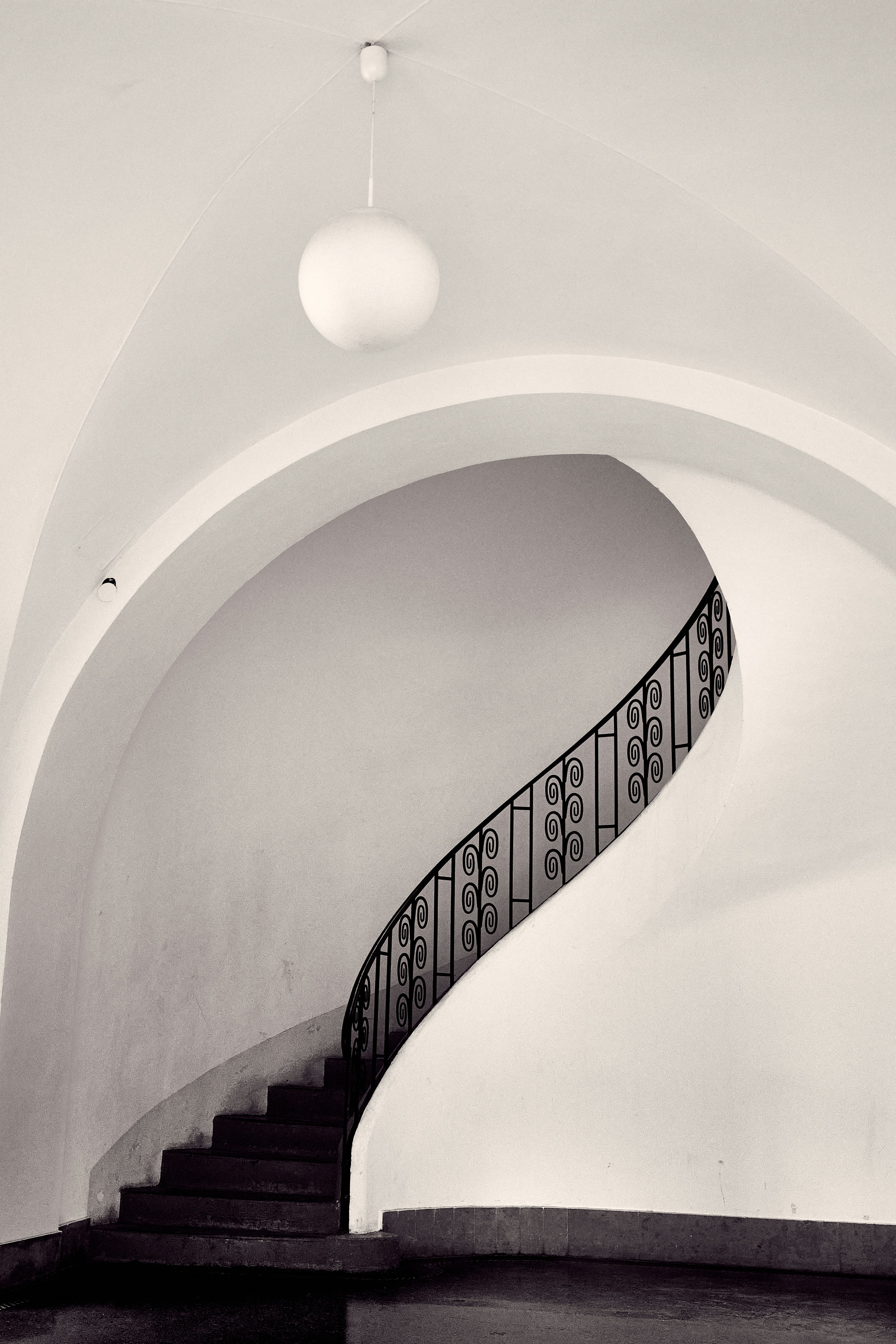 Spiral Staircase in Sepia Silence