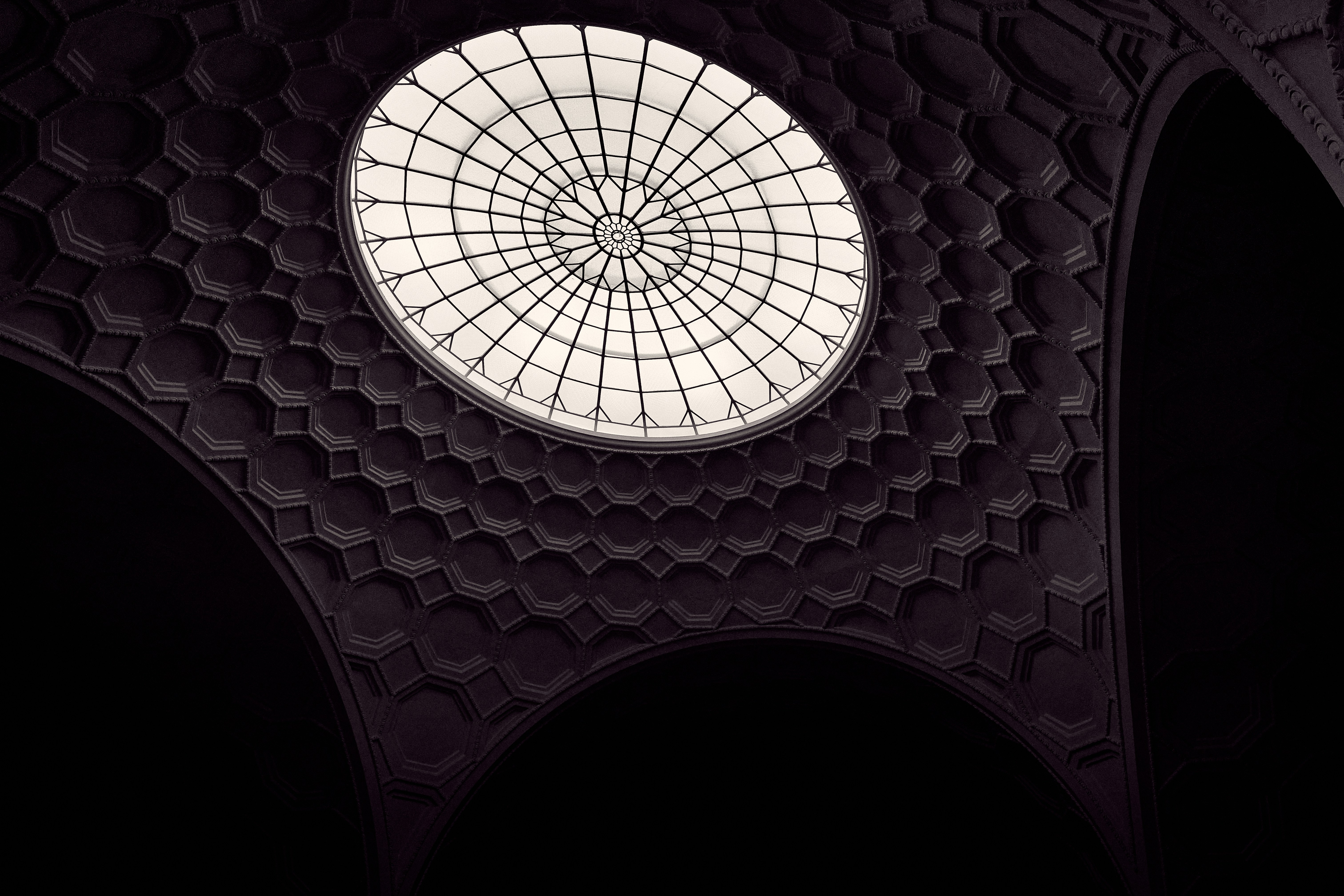 Celestial Dome: Circular Skylight Framed by Hexagonal Vaults