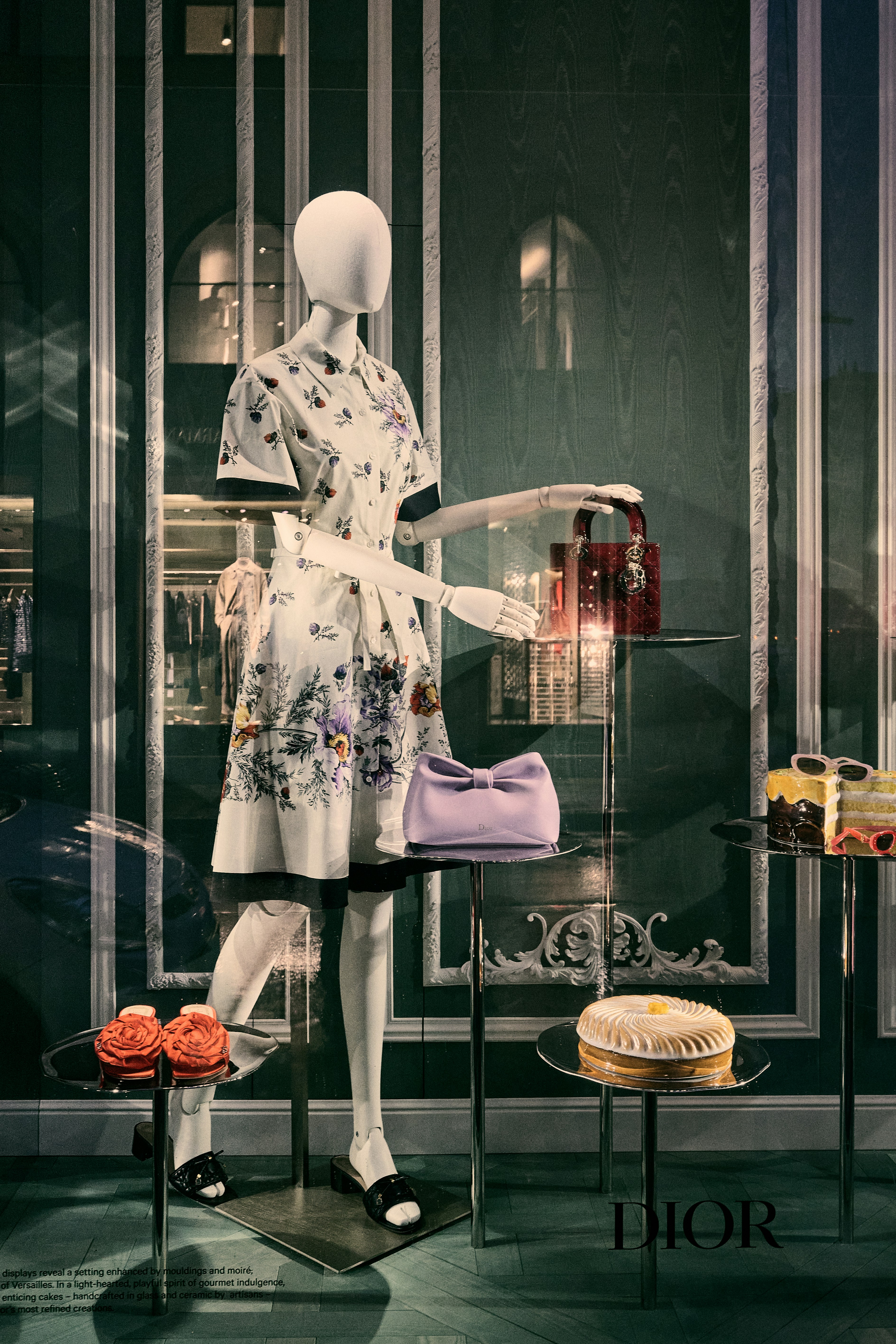 Silhouetted Style: A Fashion Mannequin Ensemble in a Dior Display