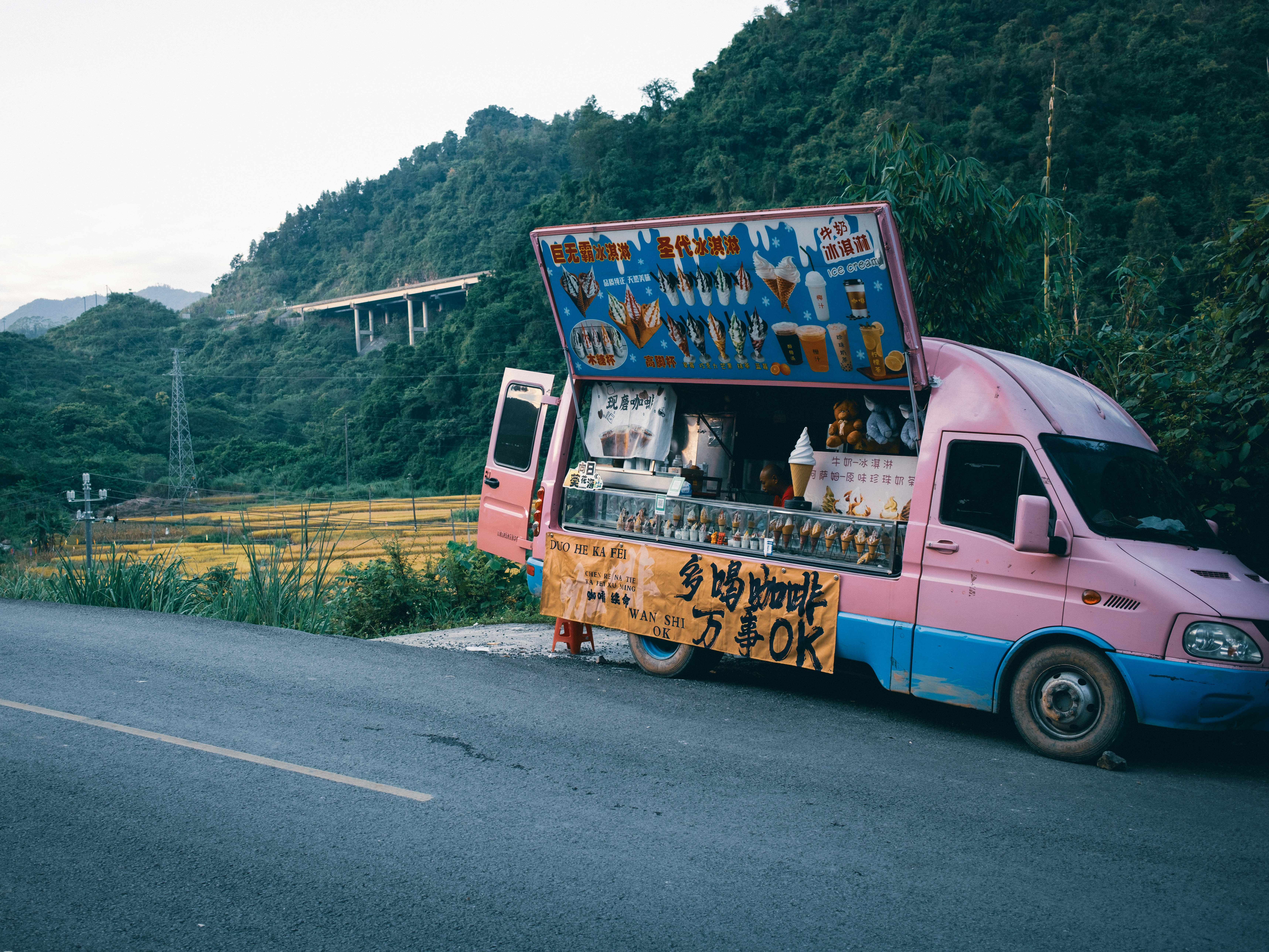 Pastel Snack Wagon on a Rural Road