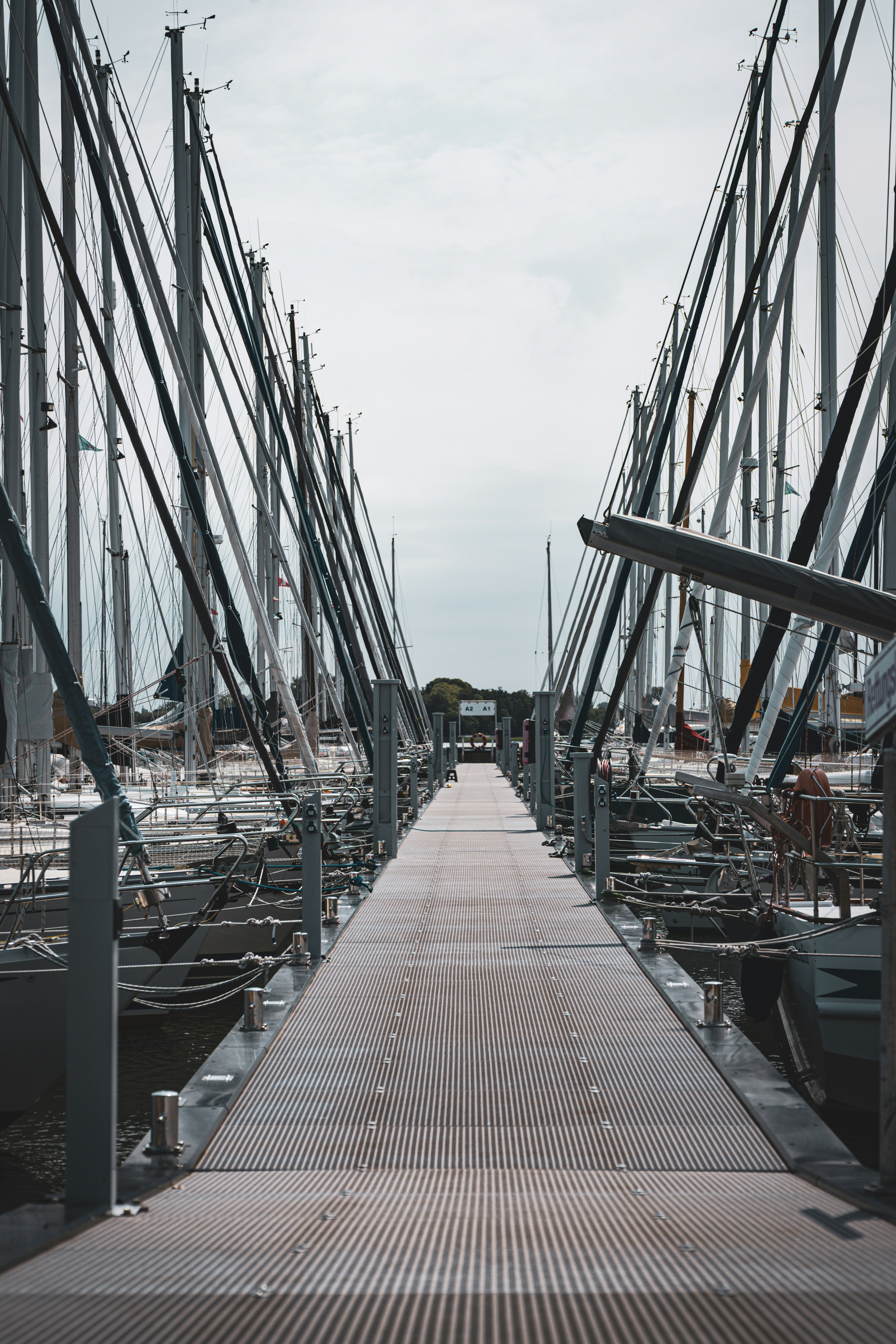 Central Pier Toward the Horizon: A Symmetrical Marina Walkway