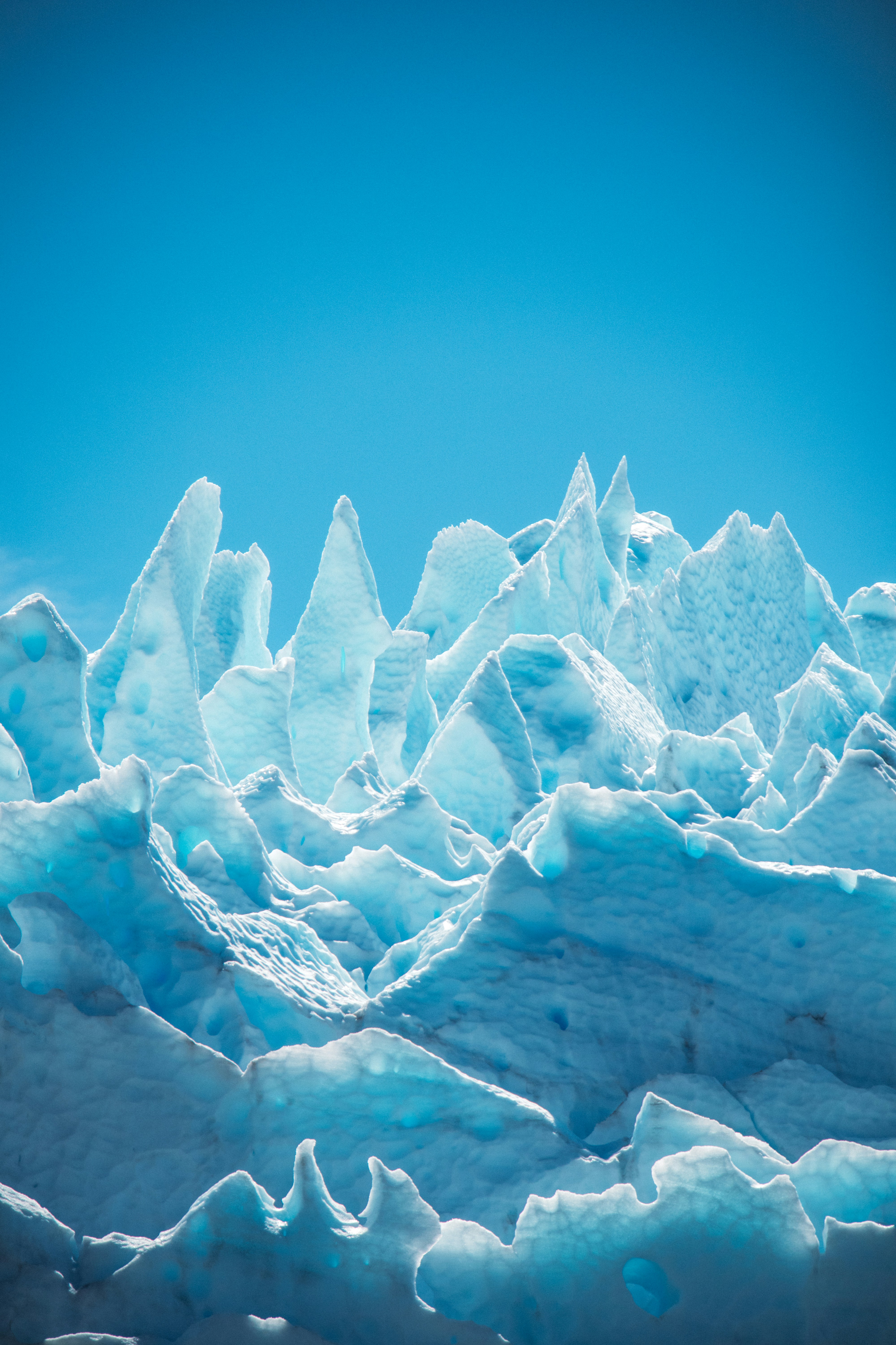 Glacial Peaks under a Vivid Clear Sky