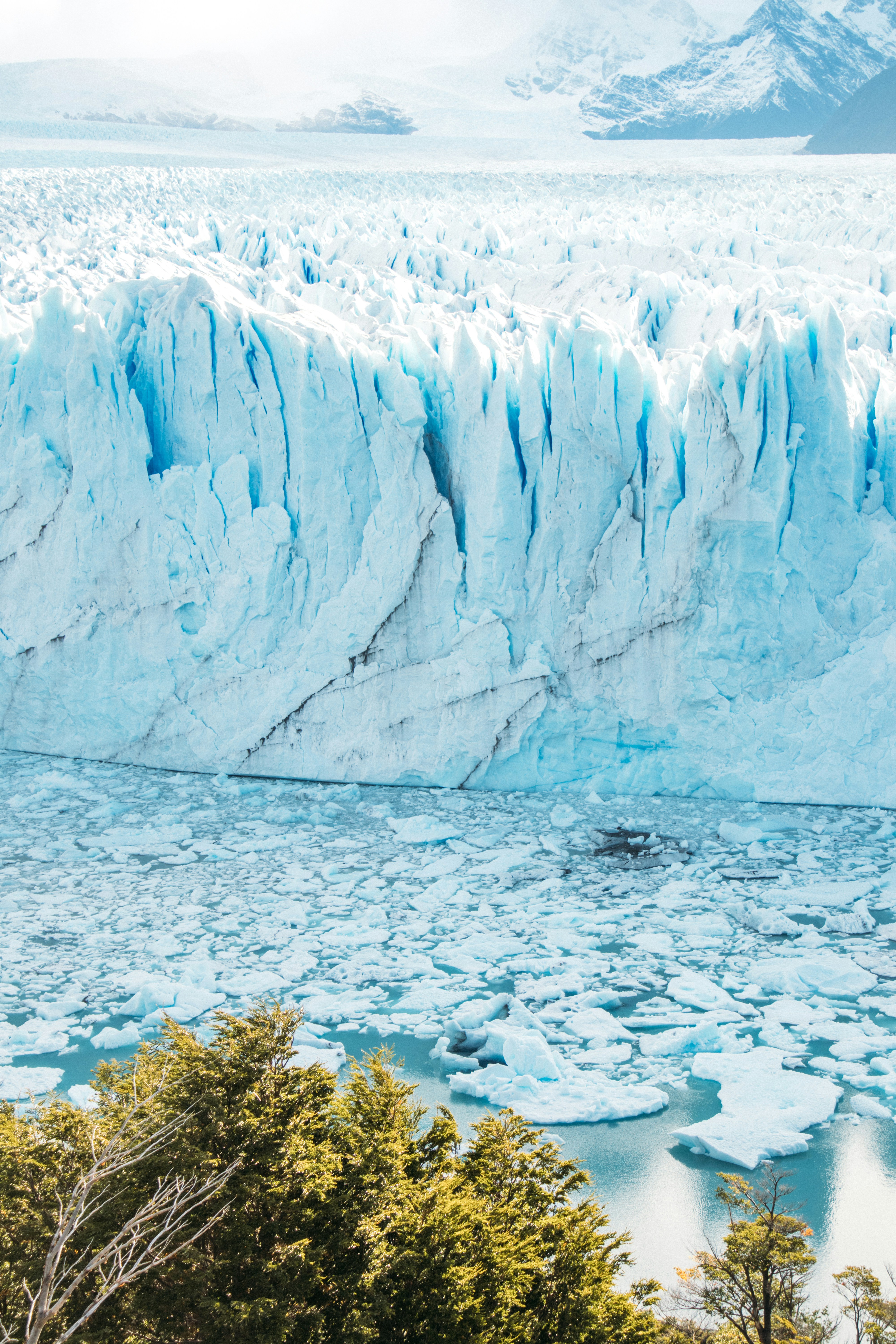 Glacial Crest Over Ice-Blue Fjord
