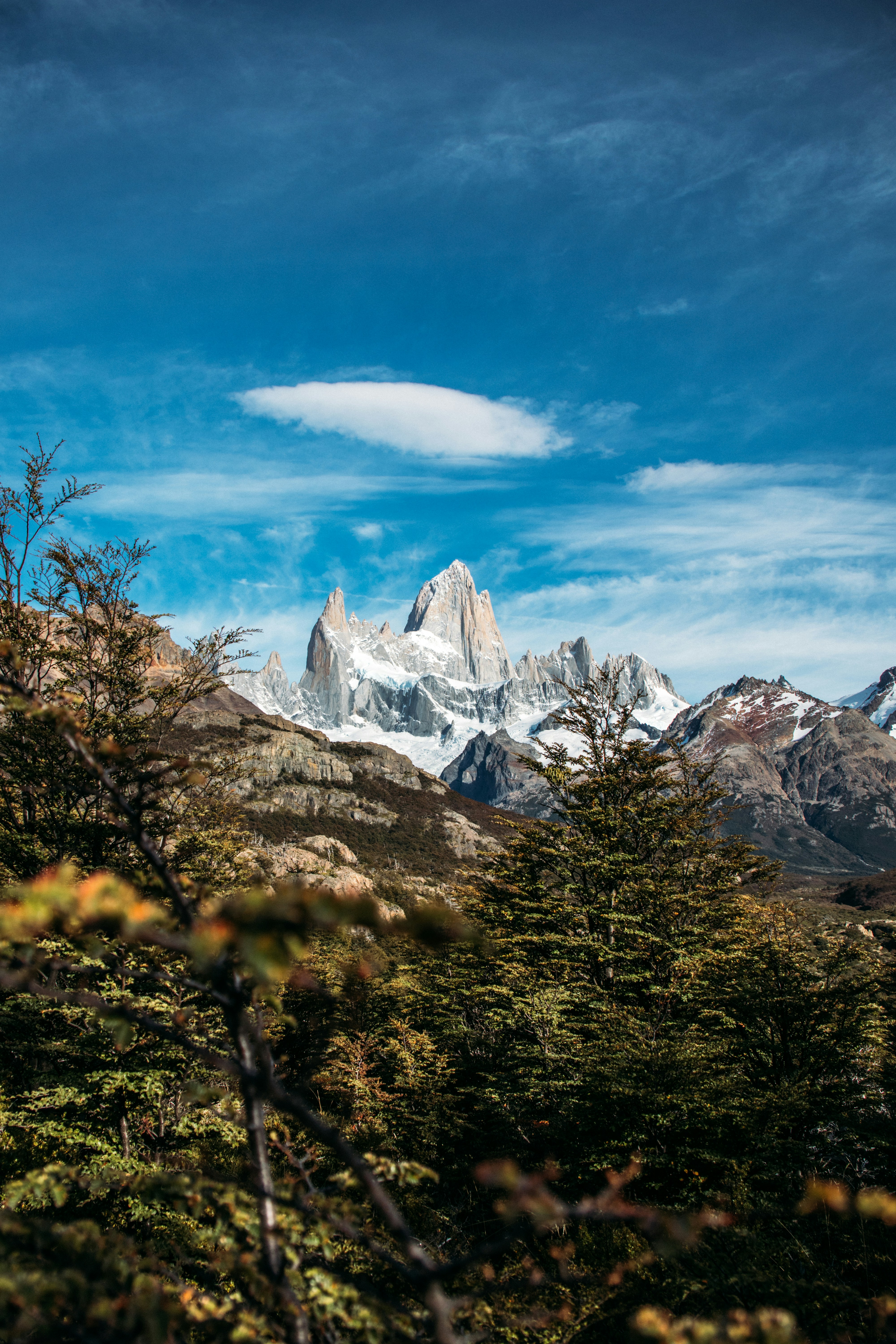 Snow-capped Peak Piercing the Blue Sky