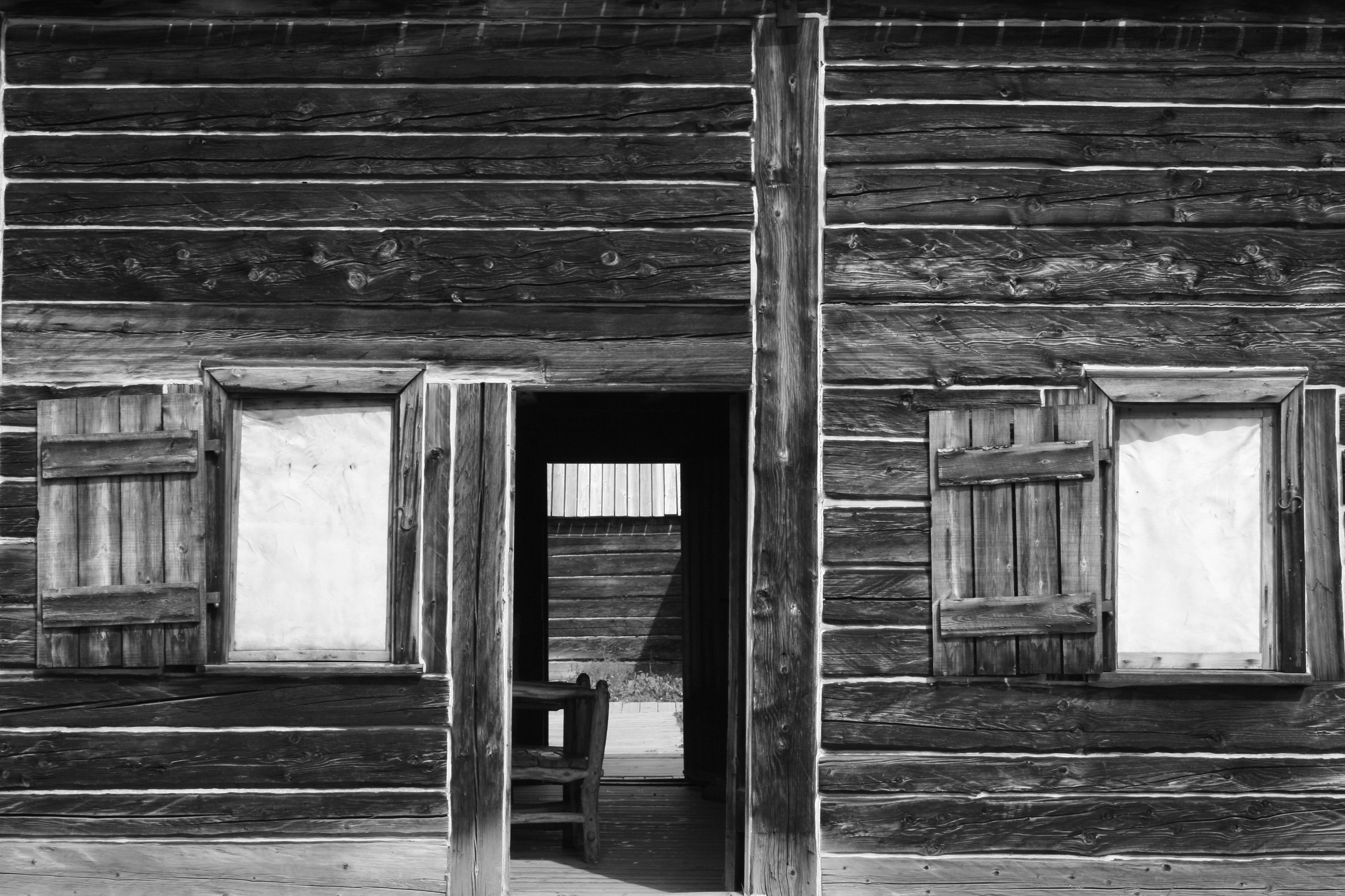 Weathered Threshold: A Silent Doorway into Wood and Time