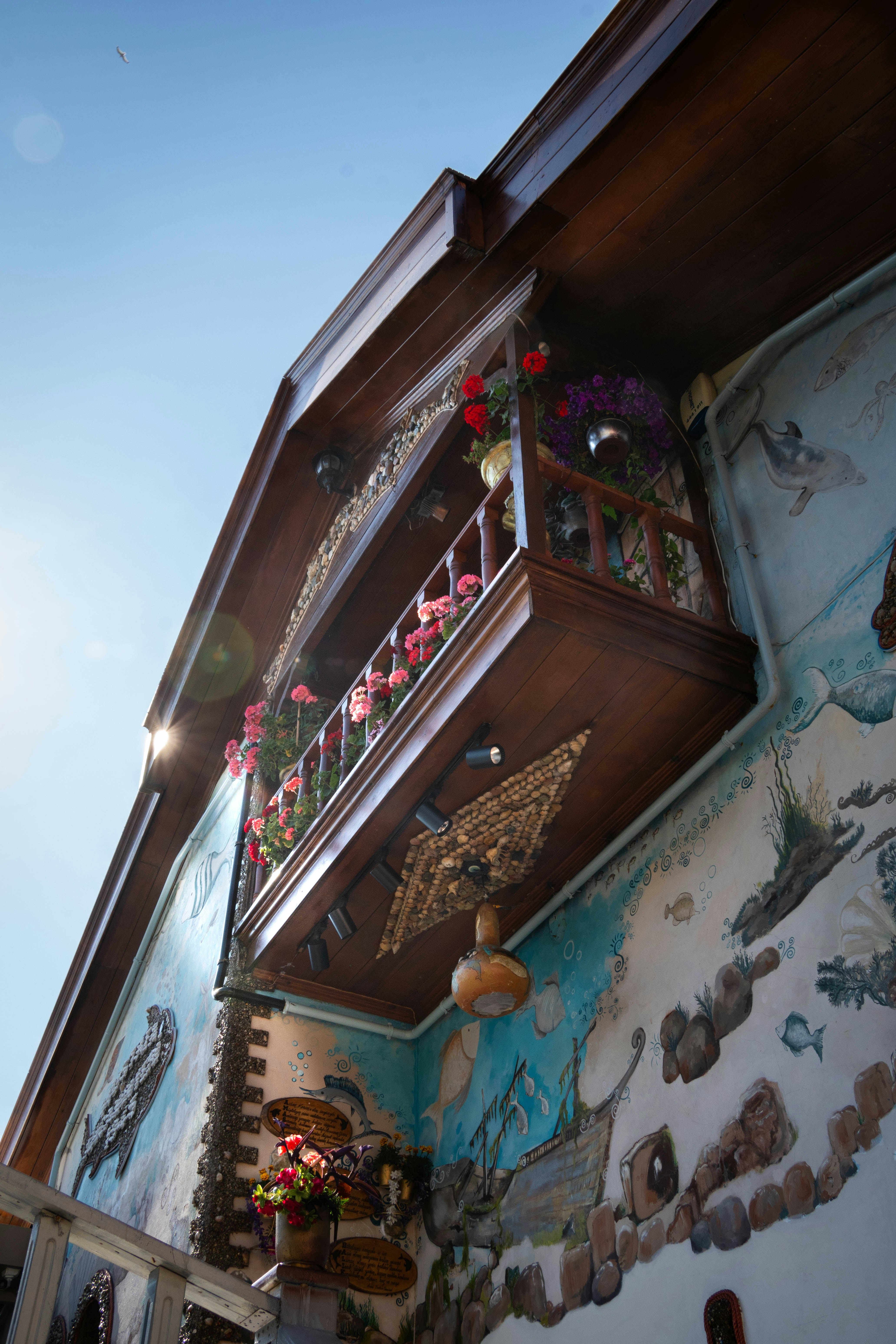 Balcony Bloom: A Floral Balcony Adorns a Painted Exterior