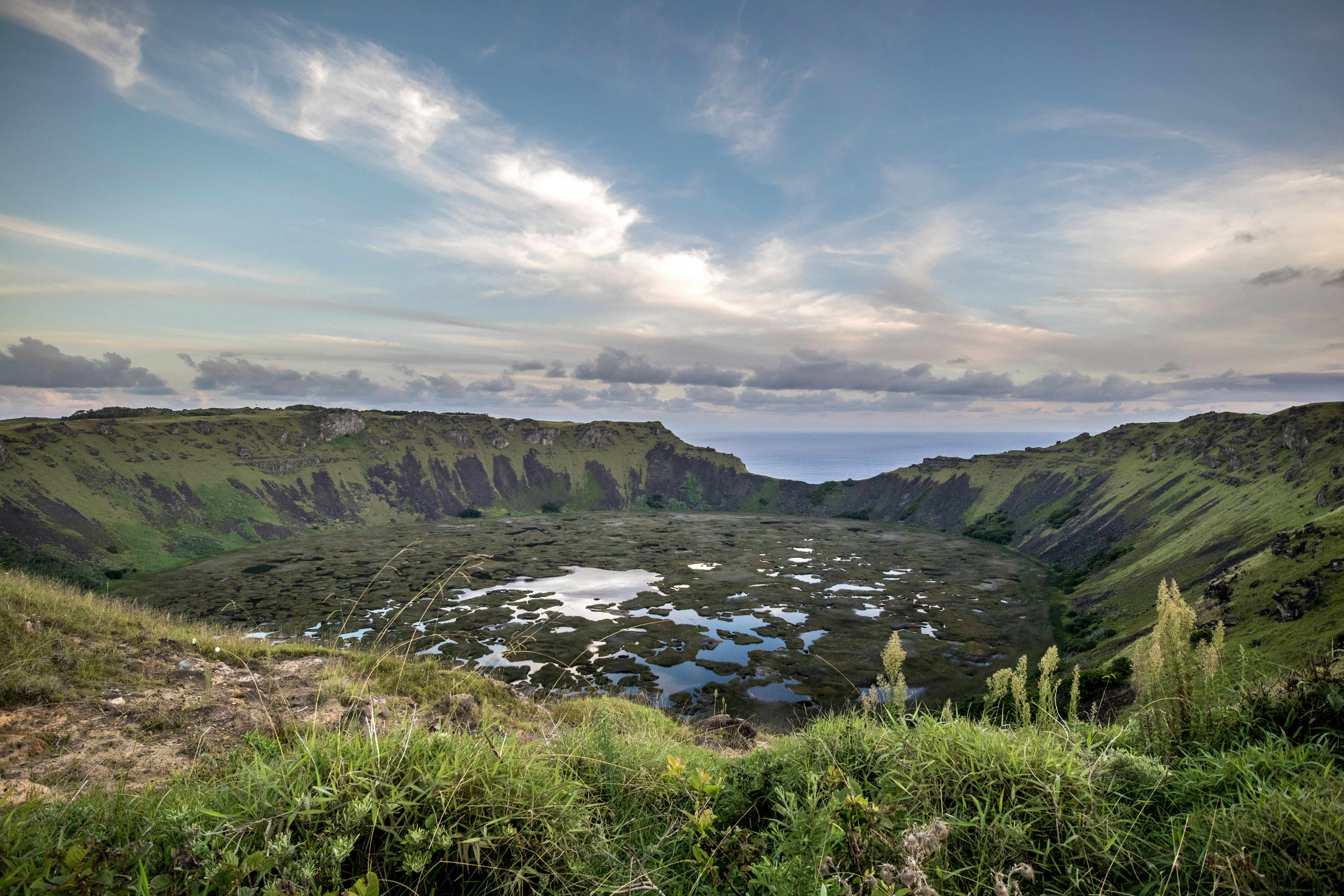 Crater Terrace at Dusk: A Green Rim Overlooking a Quiet Lake