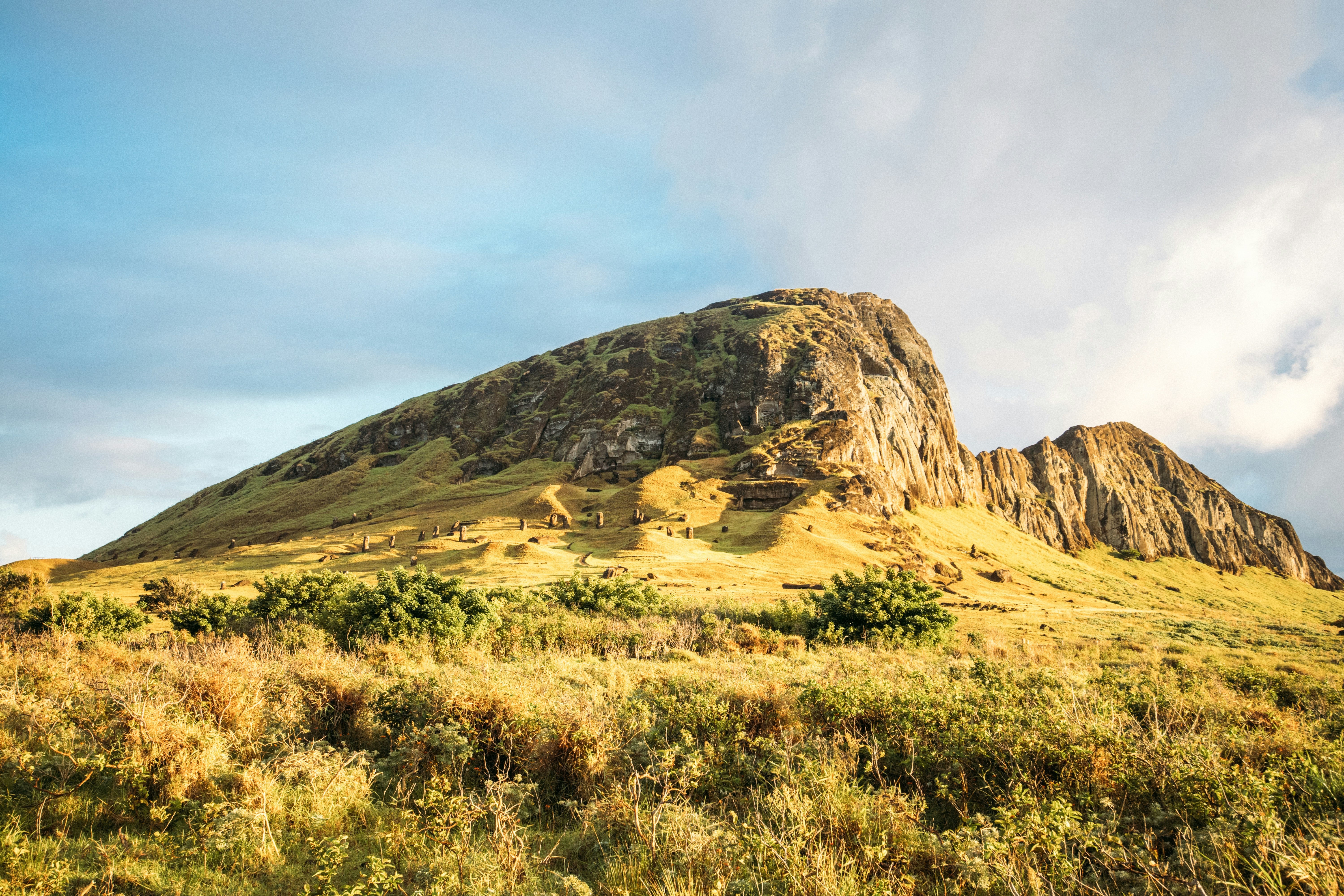 Sunlit Peak: A Rolling Moor Beneath a Quiet Sky