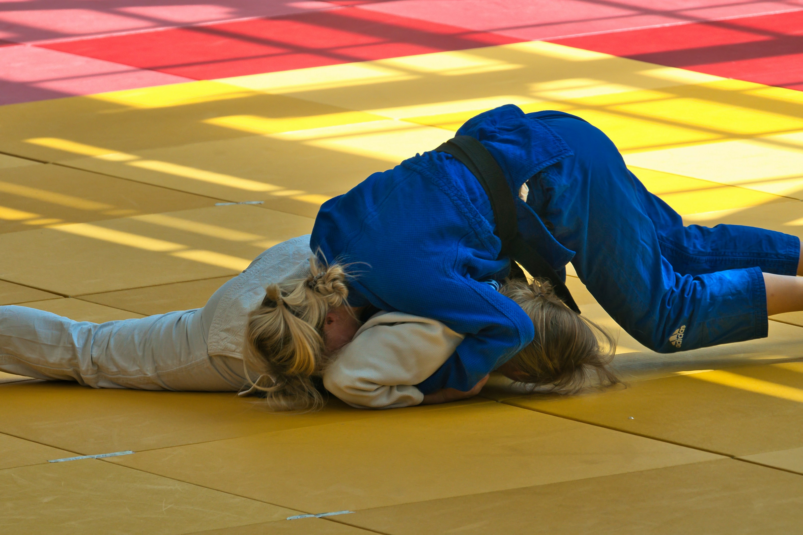 Grounded Grapple: Duel on a Sunlit Mats