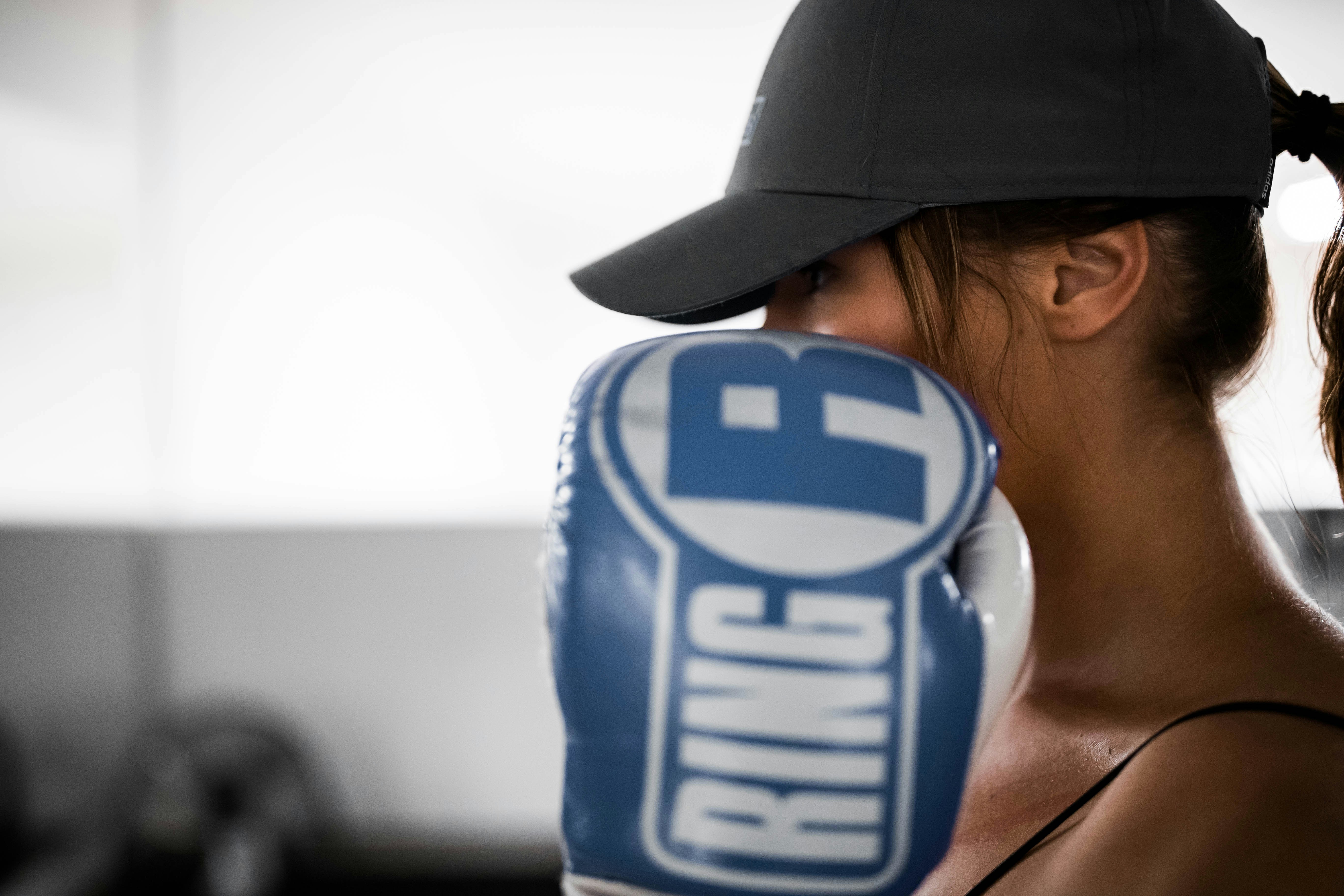 Boxing Focus: Eye Contact Hidden Behind a Glove and Cap