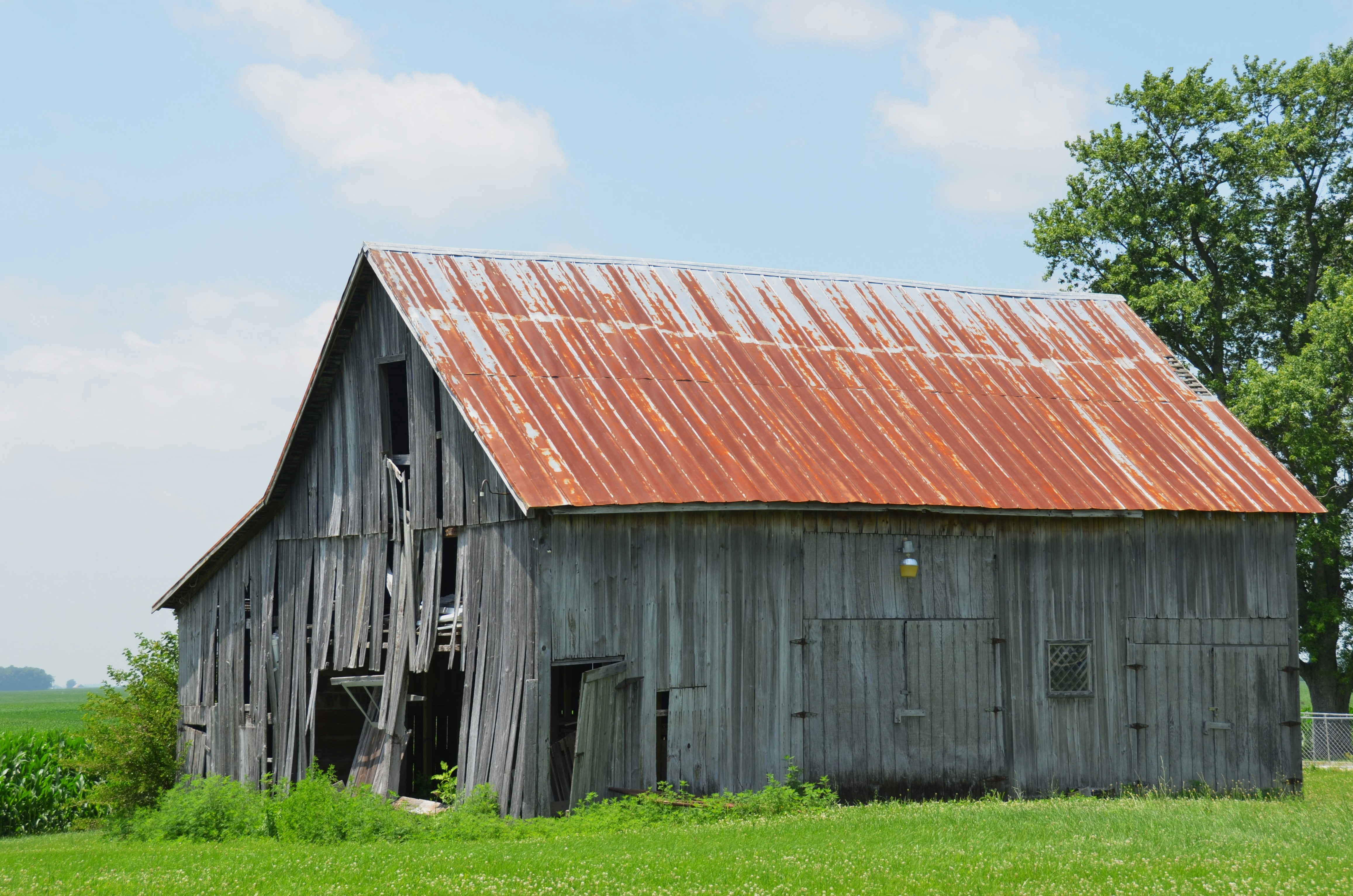 Rusty Barn Under a Bright Sky
