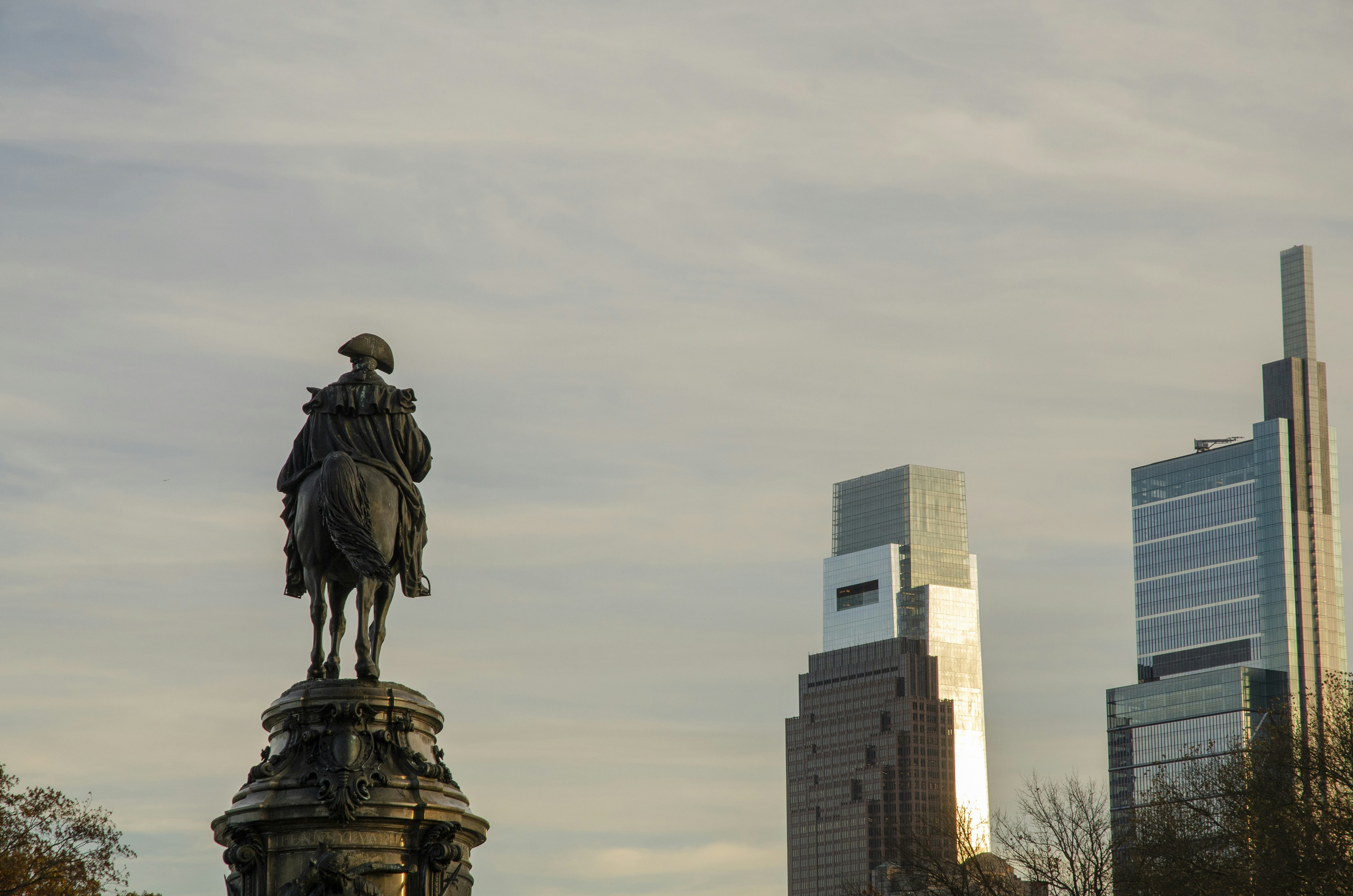 Equestrian Statue against a Modern Skyline