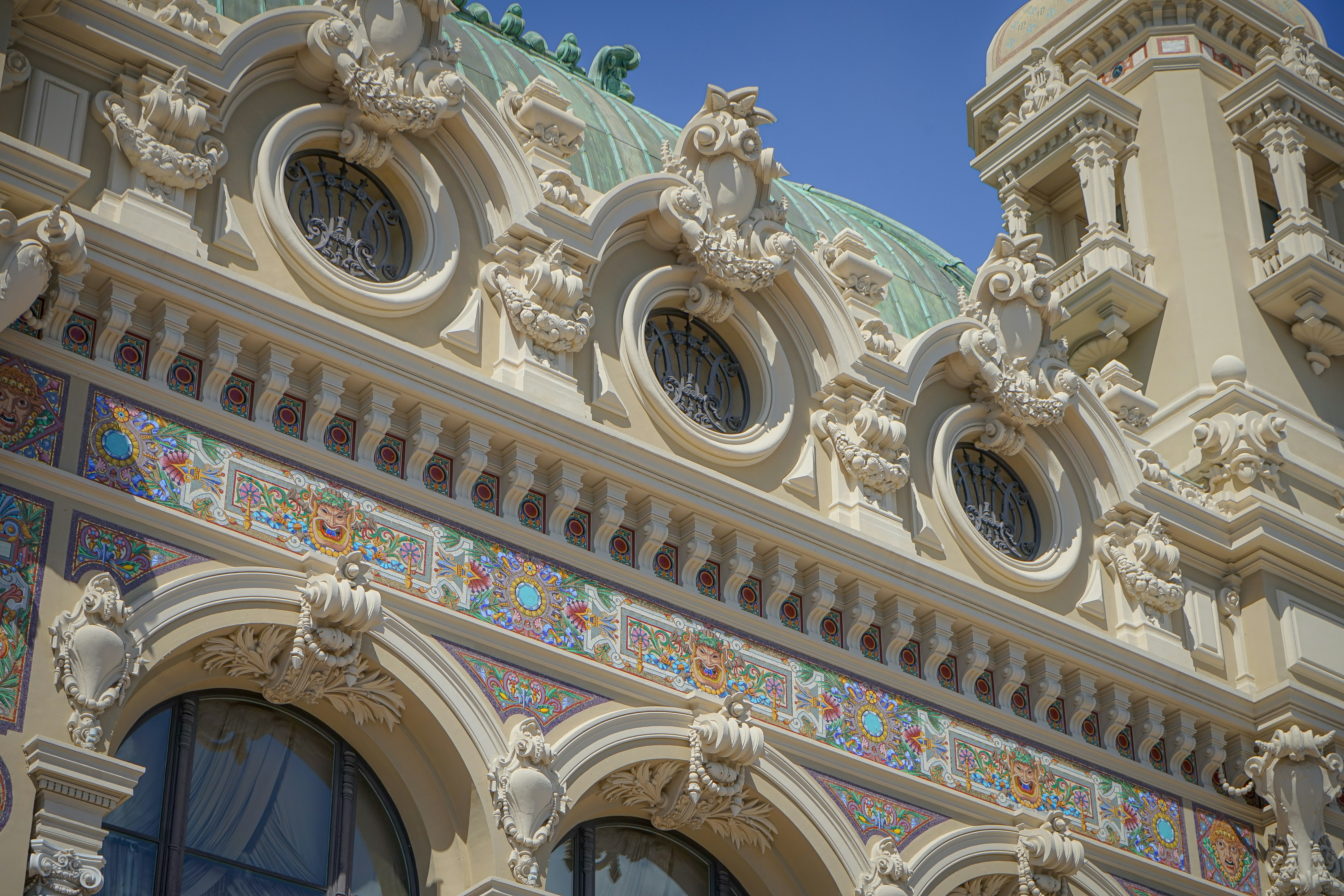 Ornate Facade in Sunlit Detail: A Cathedral of Curves and Tiles