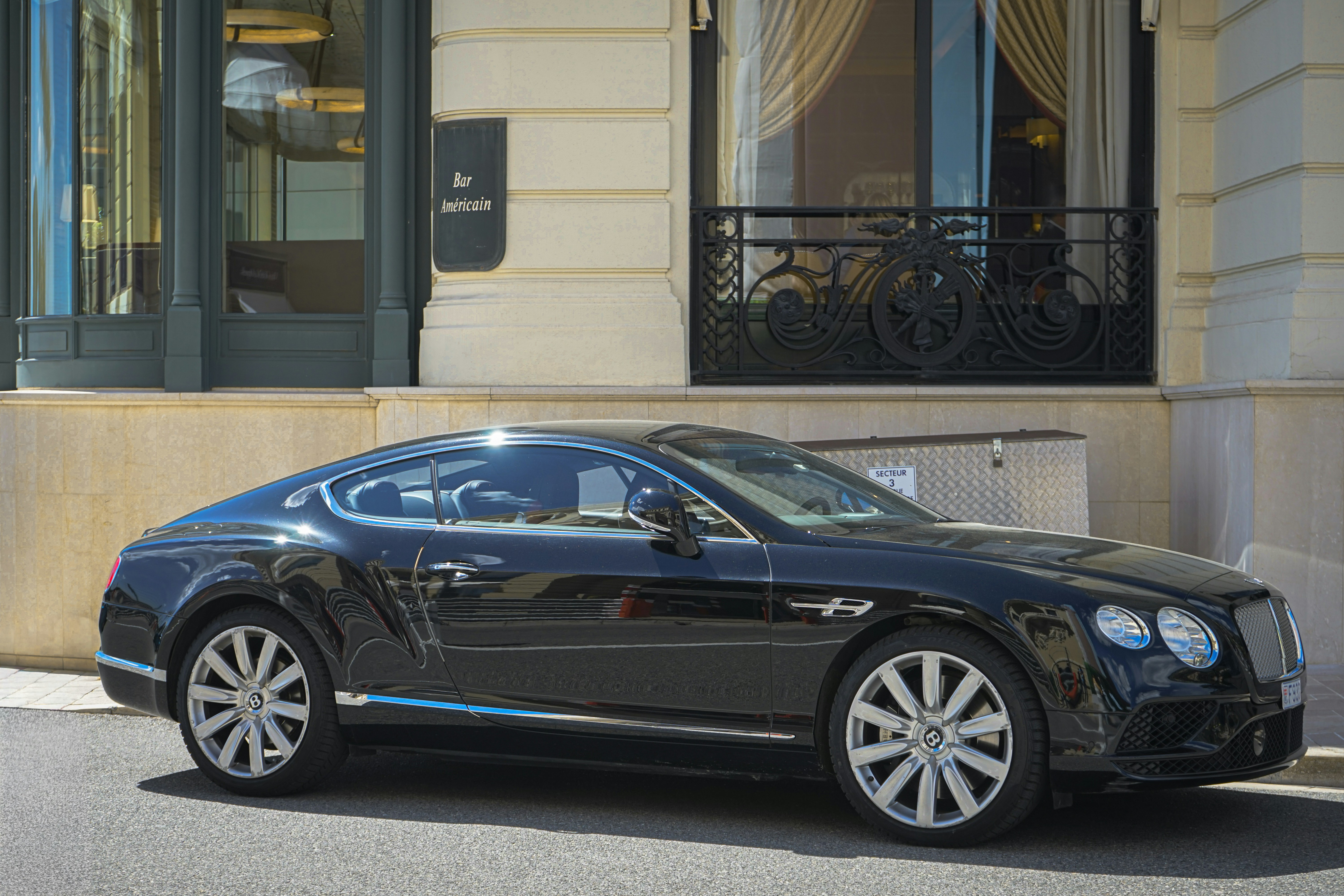 Midnight Thrill: Black Bentley on a City Street