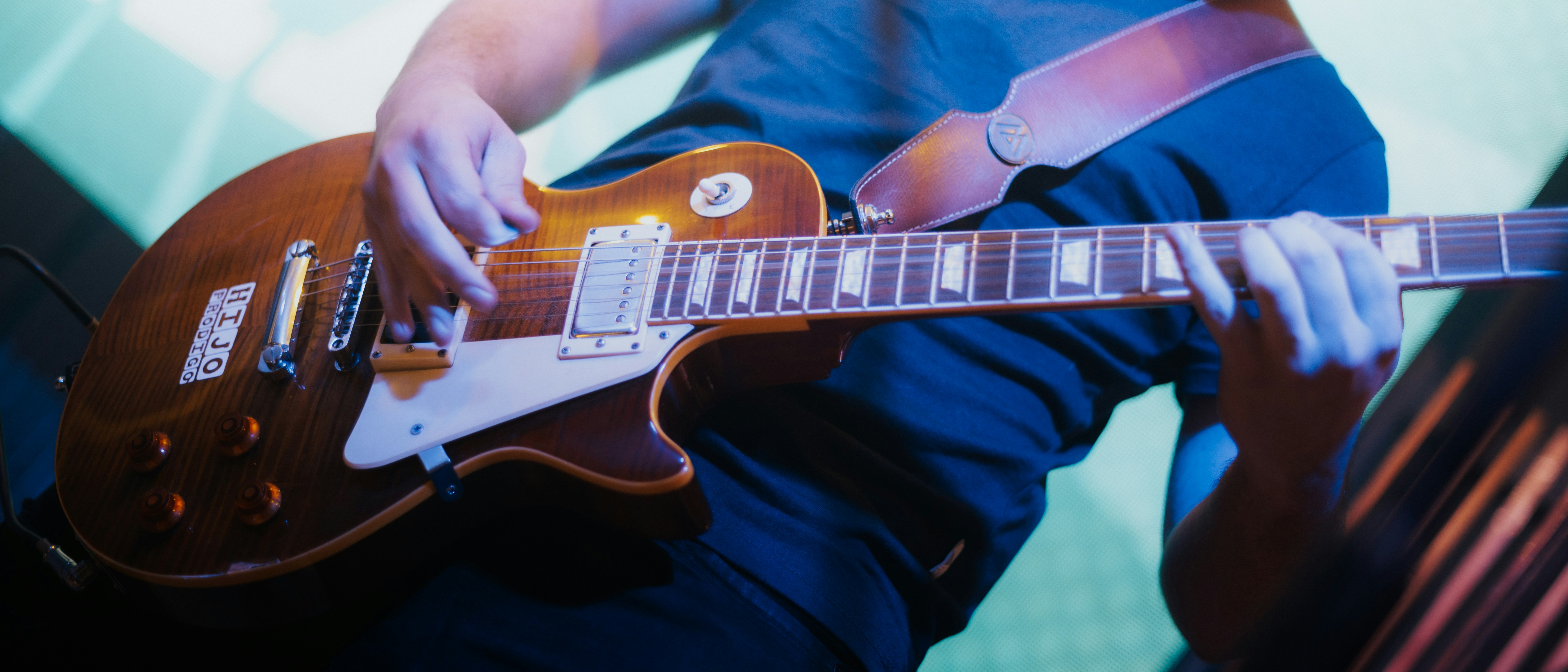 Electric Groove: hands in motion on a sunburst Les Paul