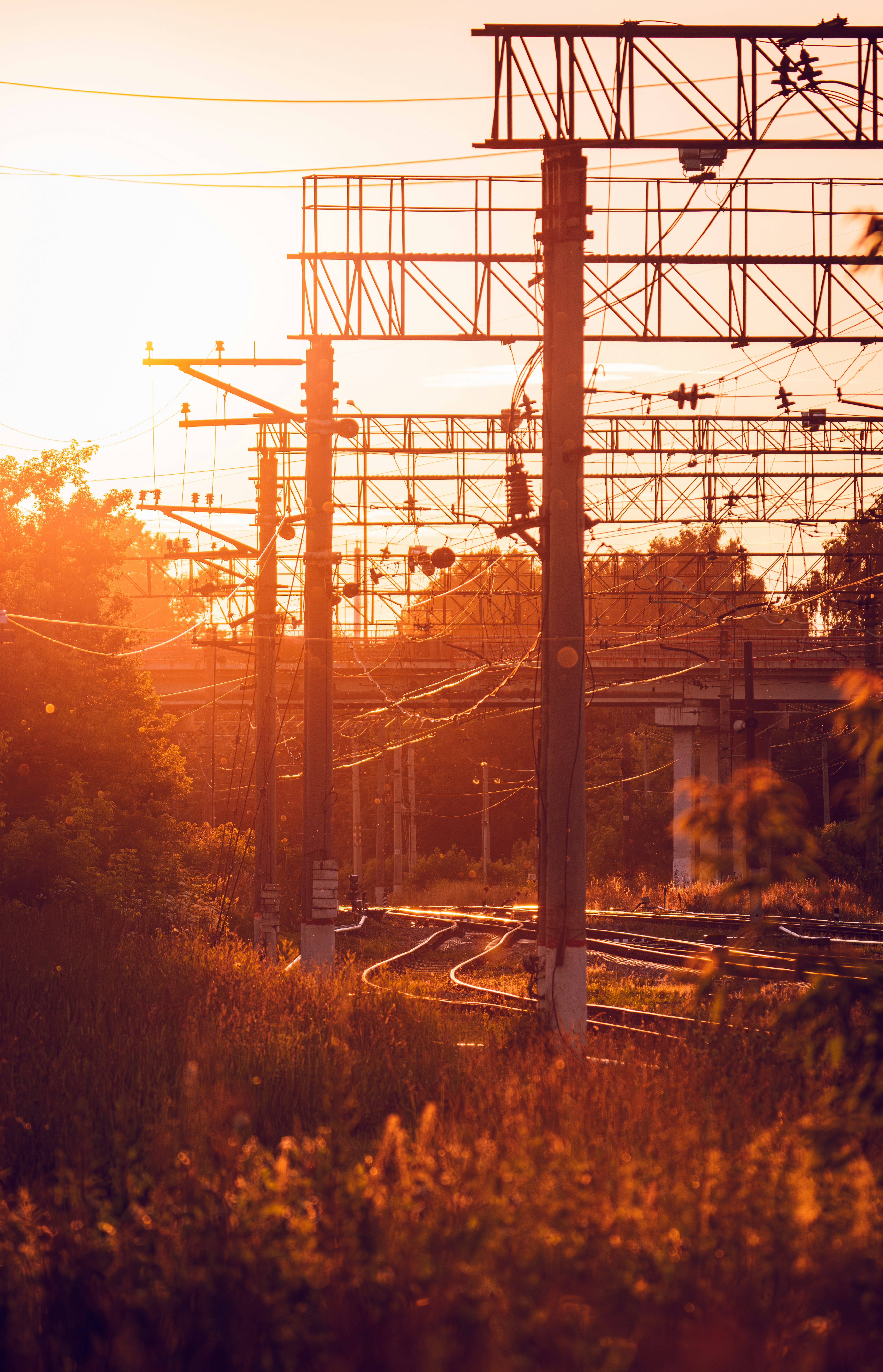 Sunset Rails: A Golden Hour Network of Tracks and Towers