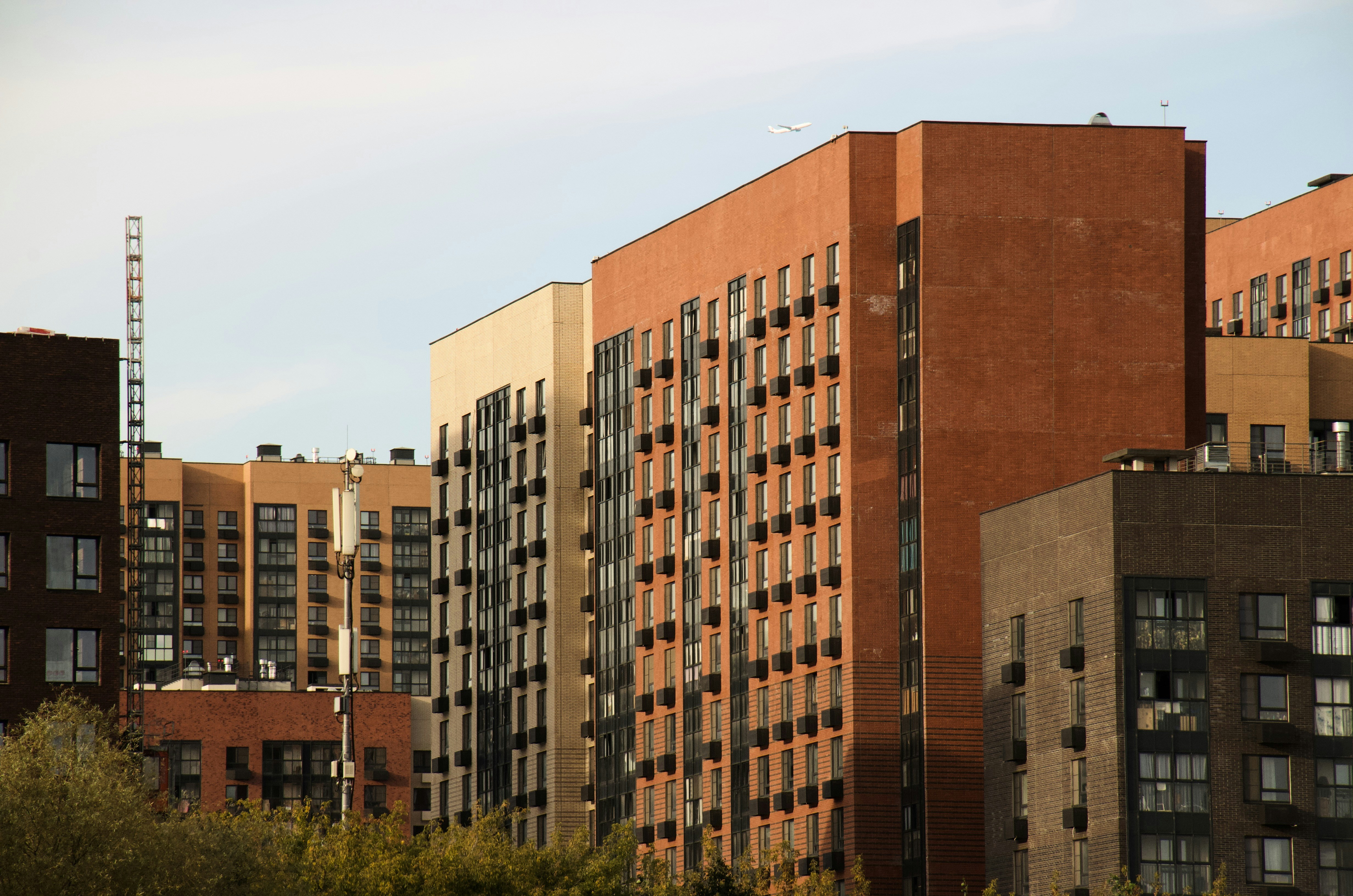 Sunlit Brick Facades in a Quiet City Ridge