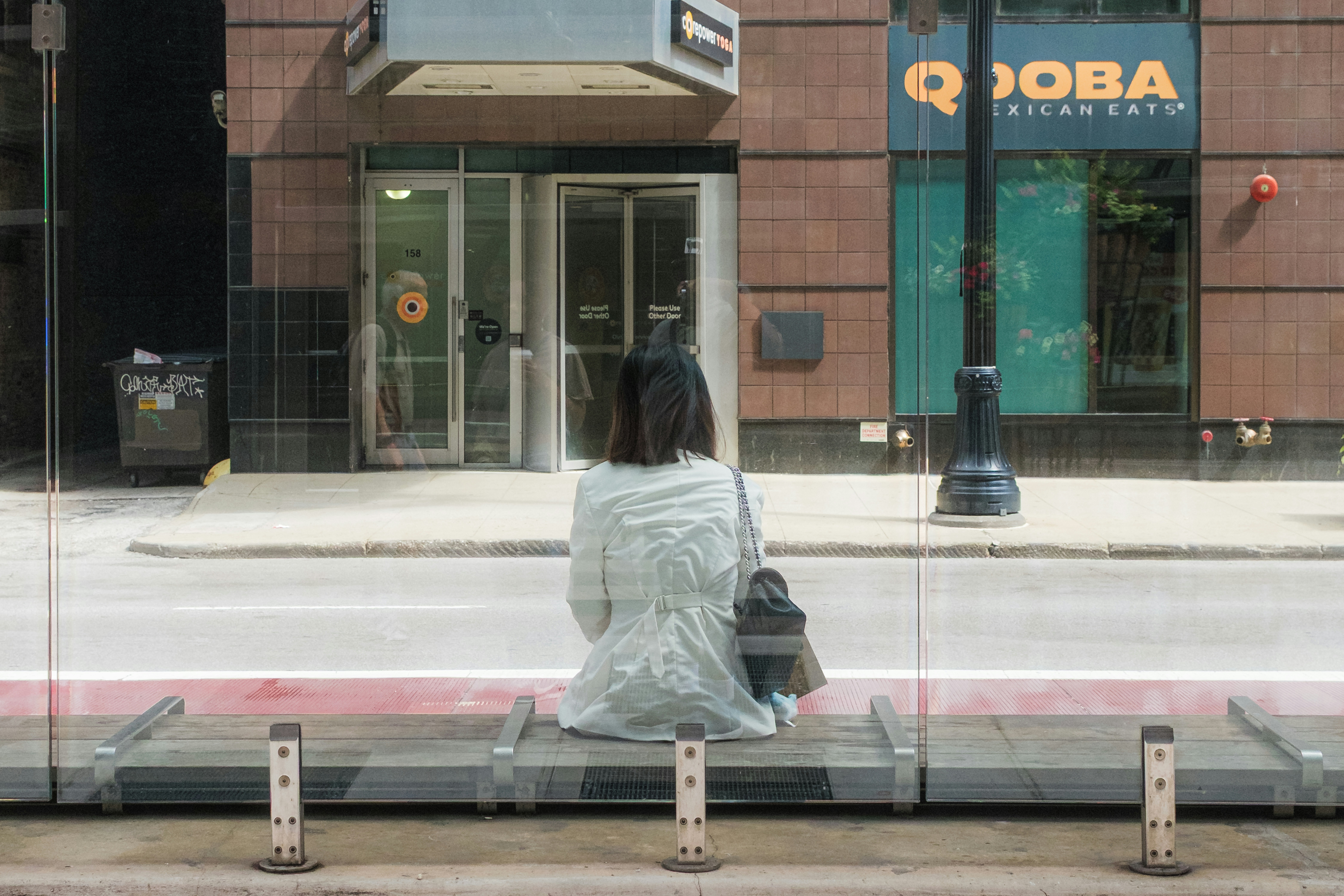 Back to the City: A Solitary Wait at the Bus Stop