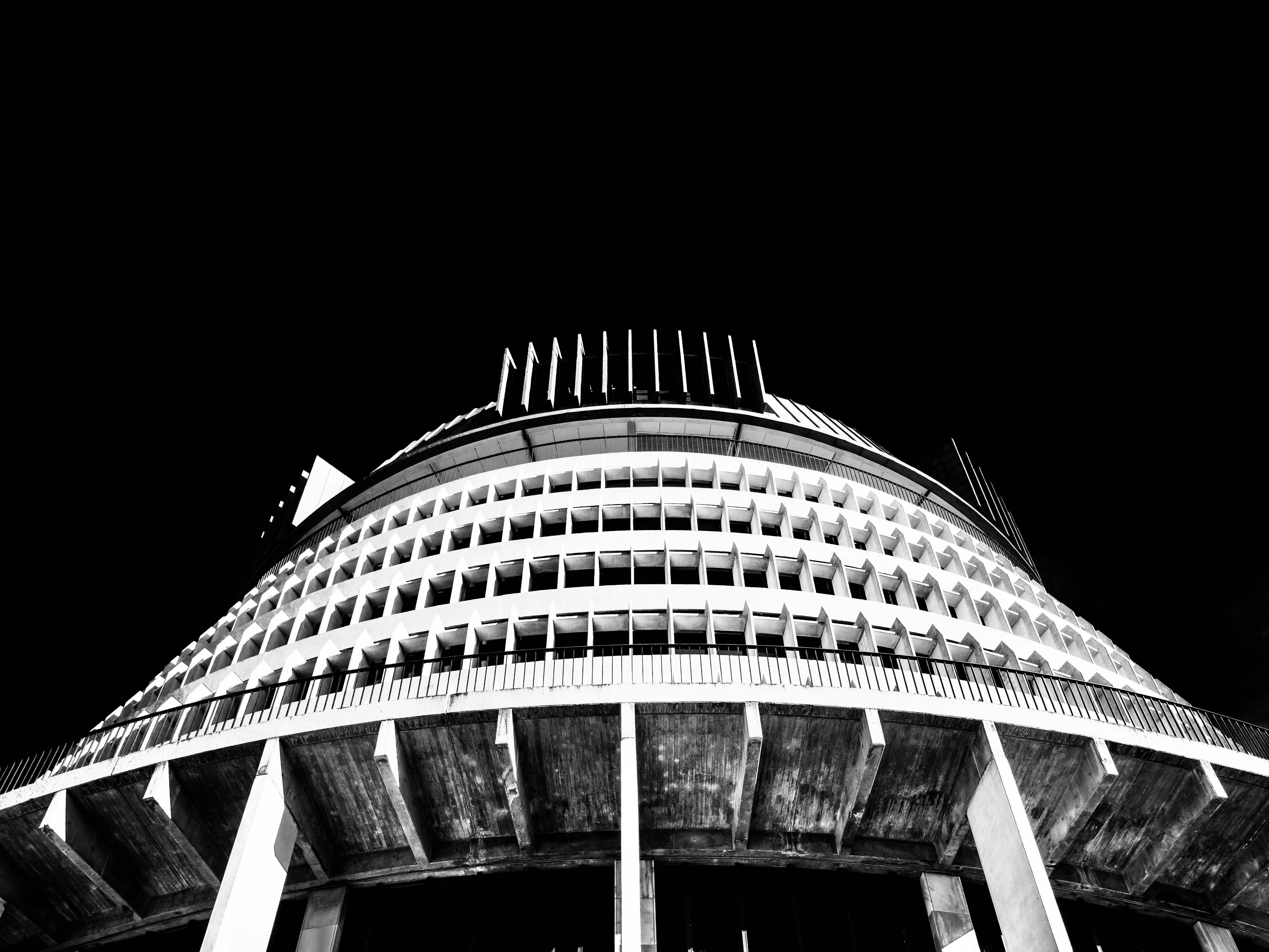 Underbelly of the Elevated Cone: Monolithic Rings Spiraling into Night