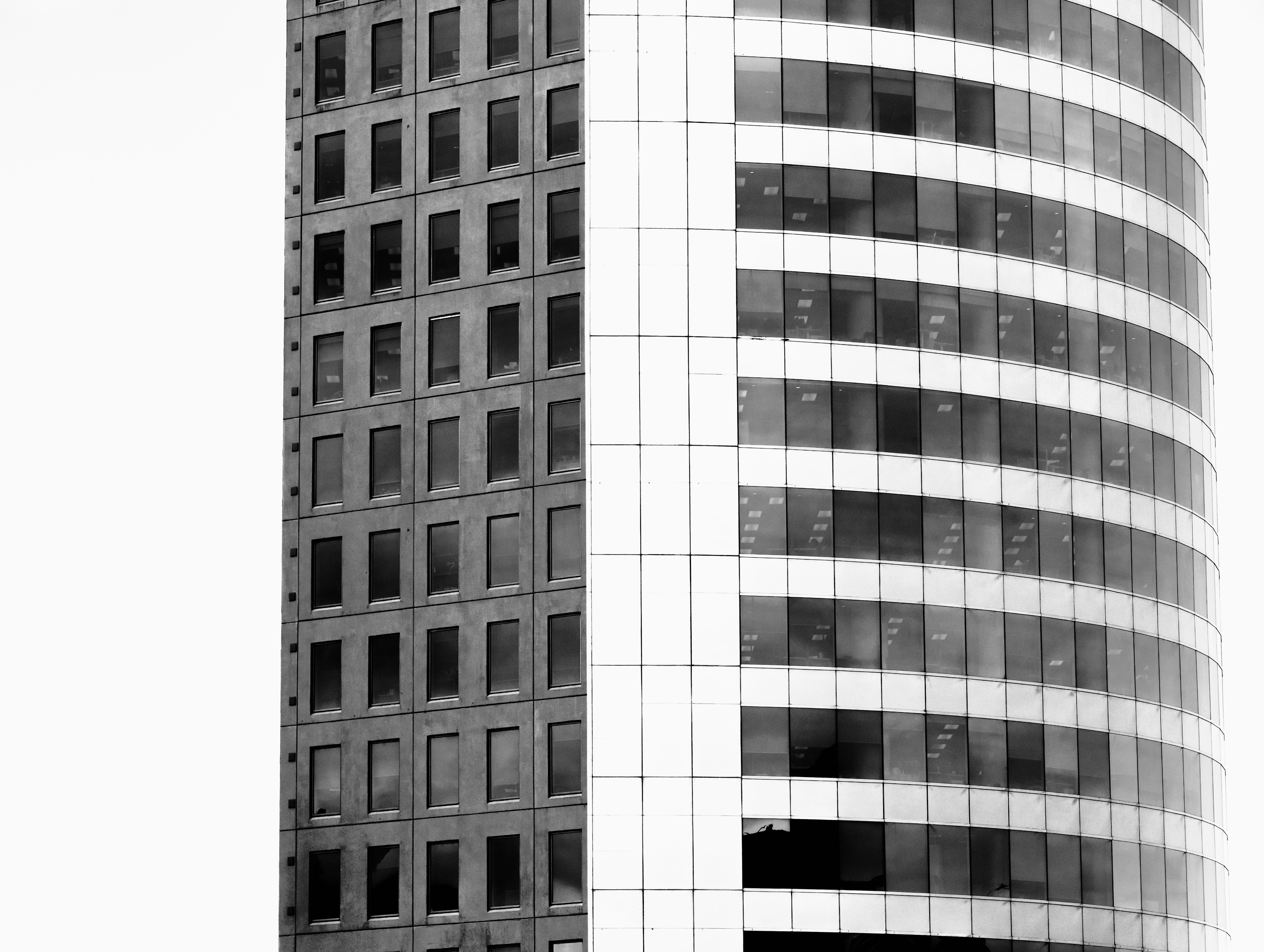 Midrise Monochrome: A Twin Facade of Beton and Glass