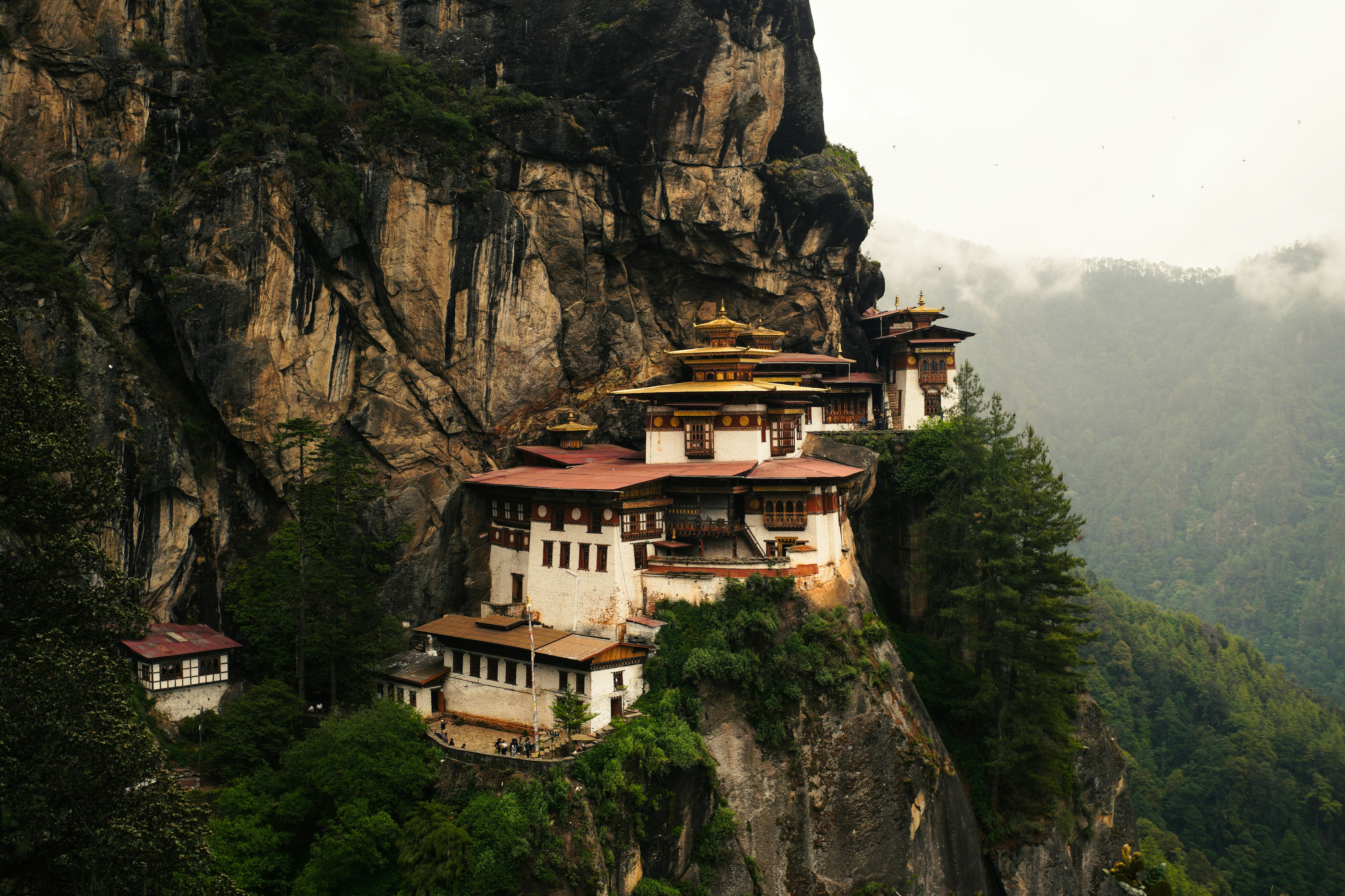 Cliffside Monastery Reach: A Row of Terraced Temples Clinging to a Mountain Face