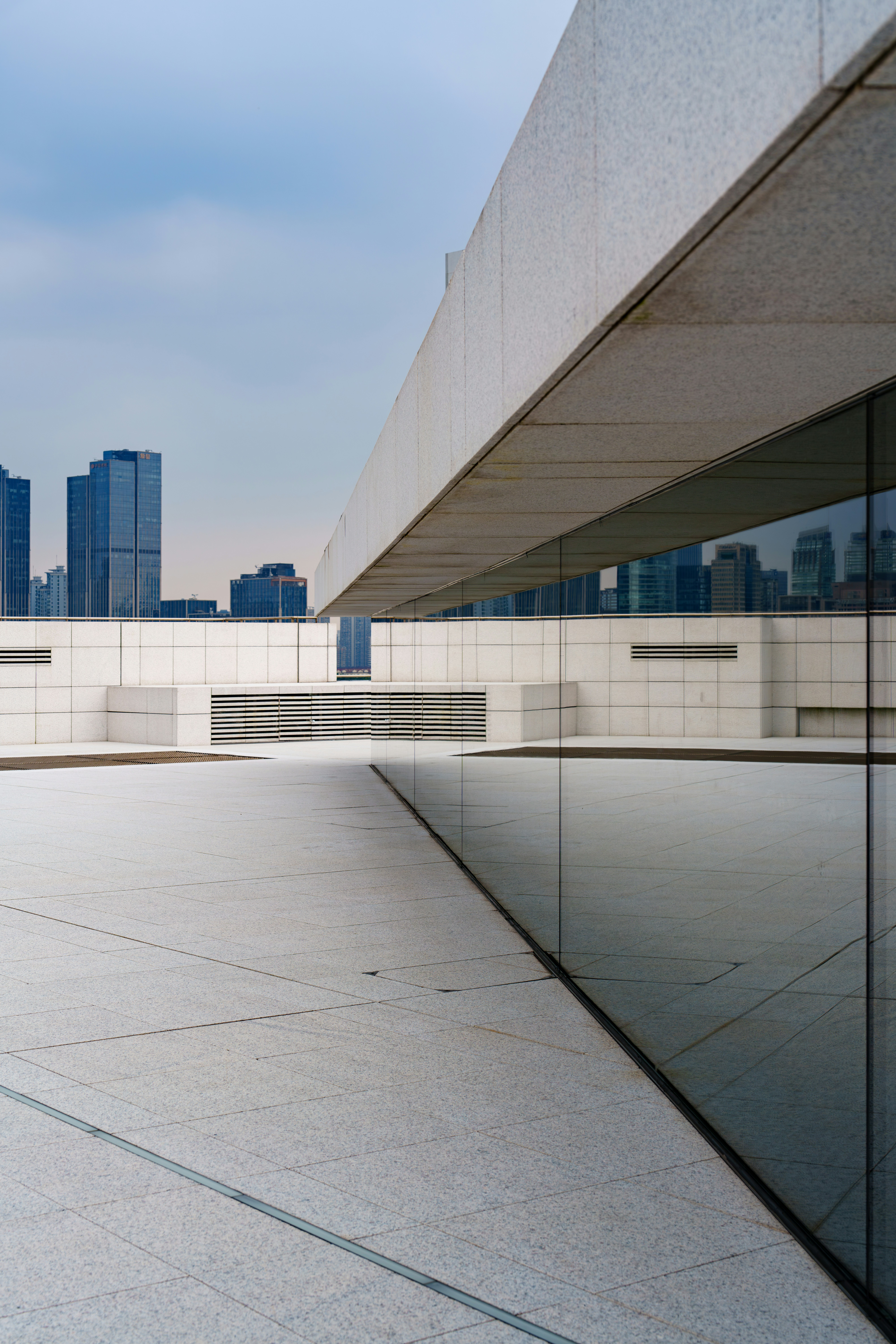 Minimalist Terrace: Glass and Concrete Converge at Dusk