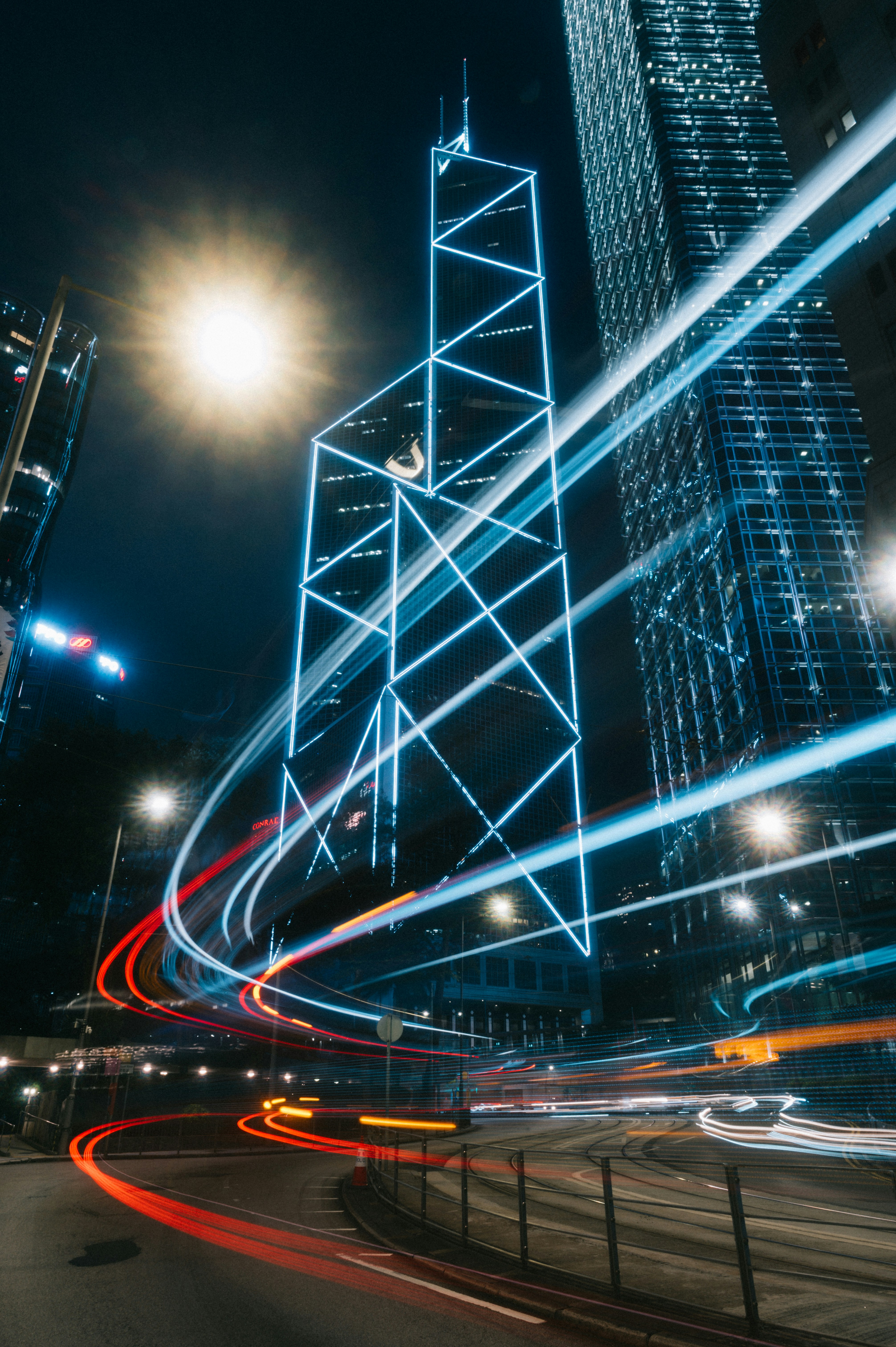 Neon Cathedral in Motion: Night Run Through a Glass-Blue Skyline